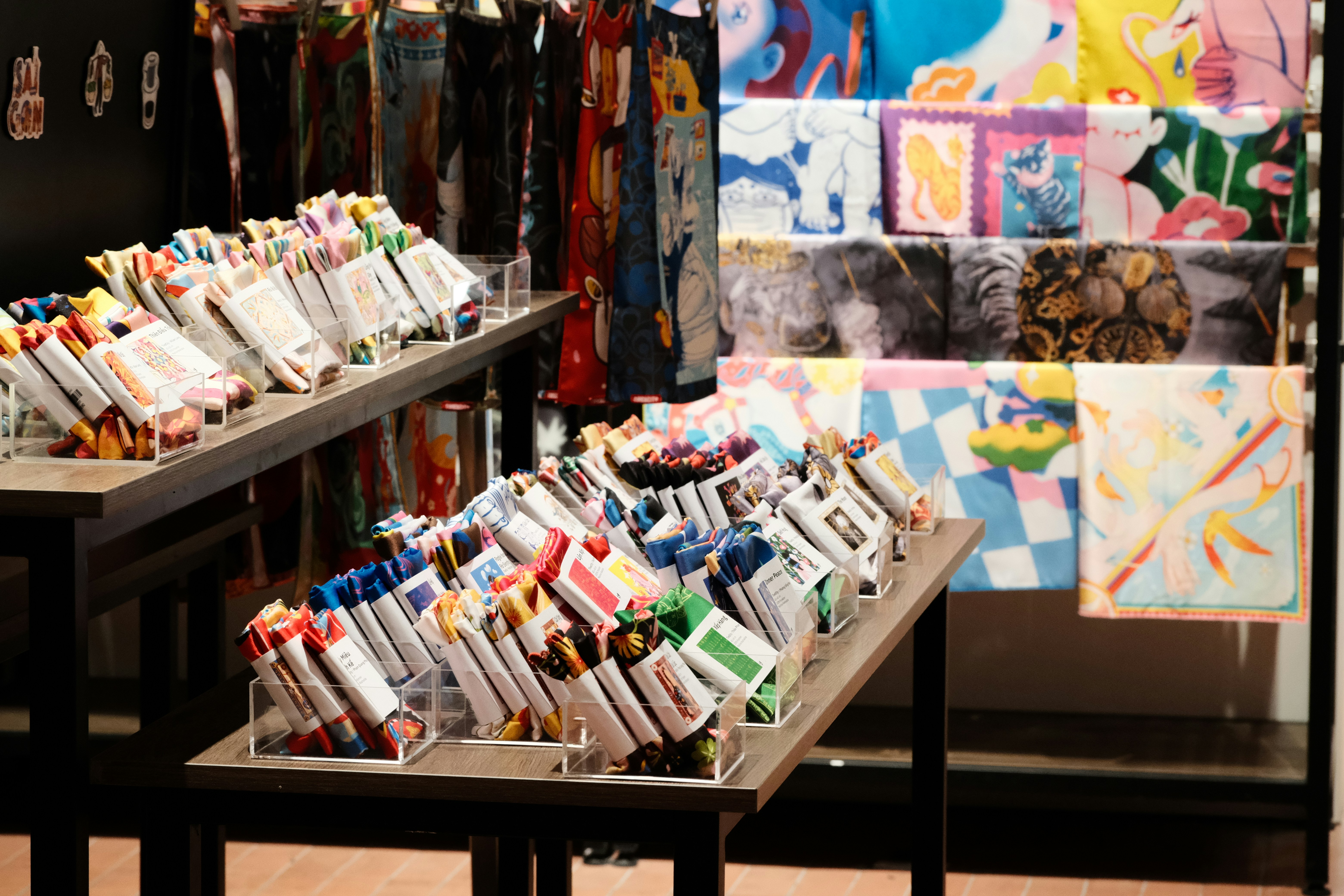 Color Cascade of Craft Pack Displays Before a Textile Backdrop