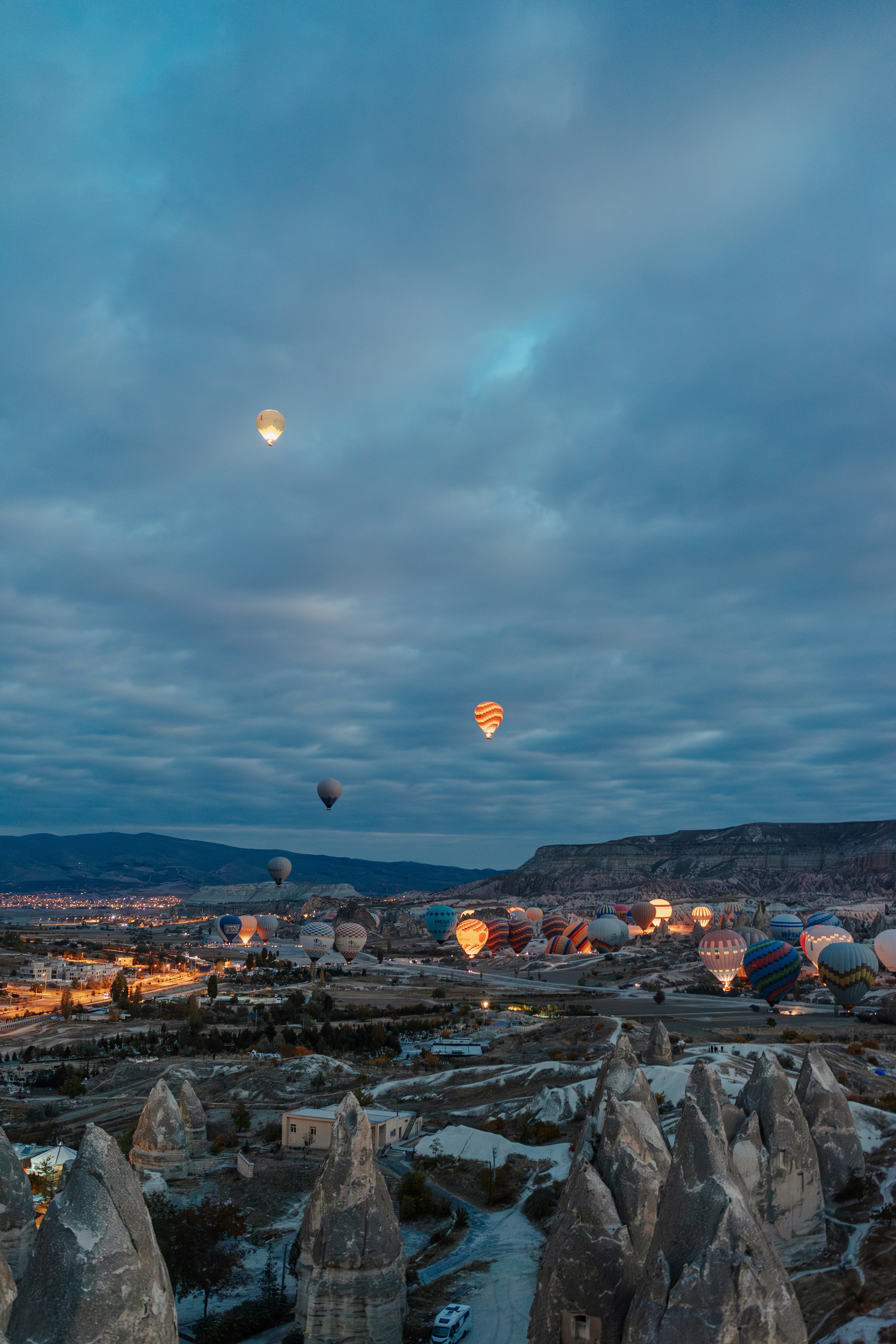 Dawn Parade of Flame-striped Balloons over Cappadocia's Fairy Chimneys