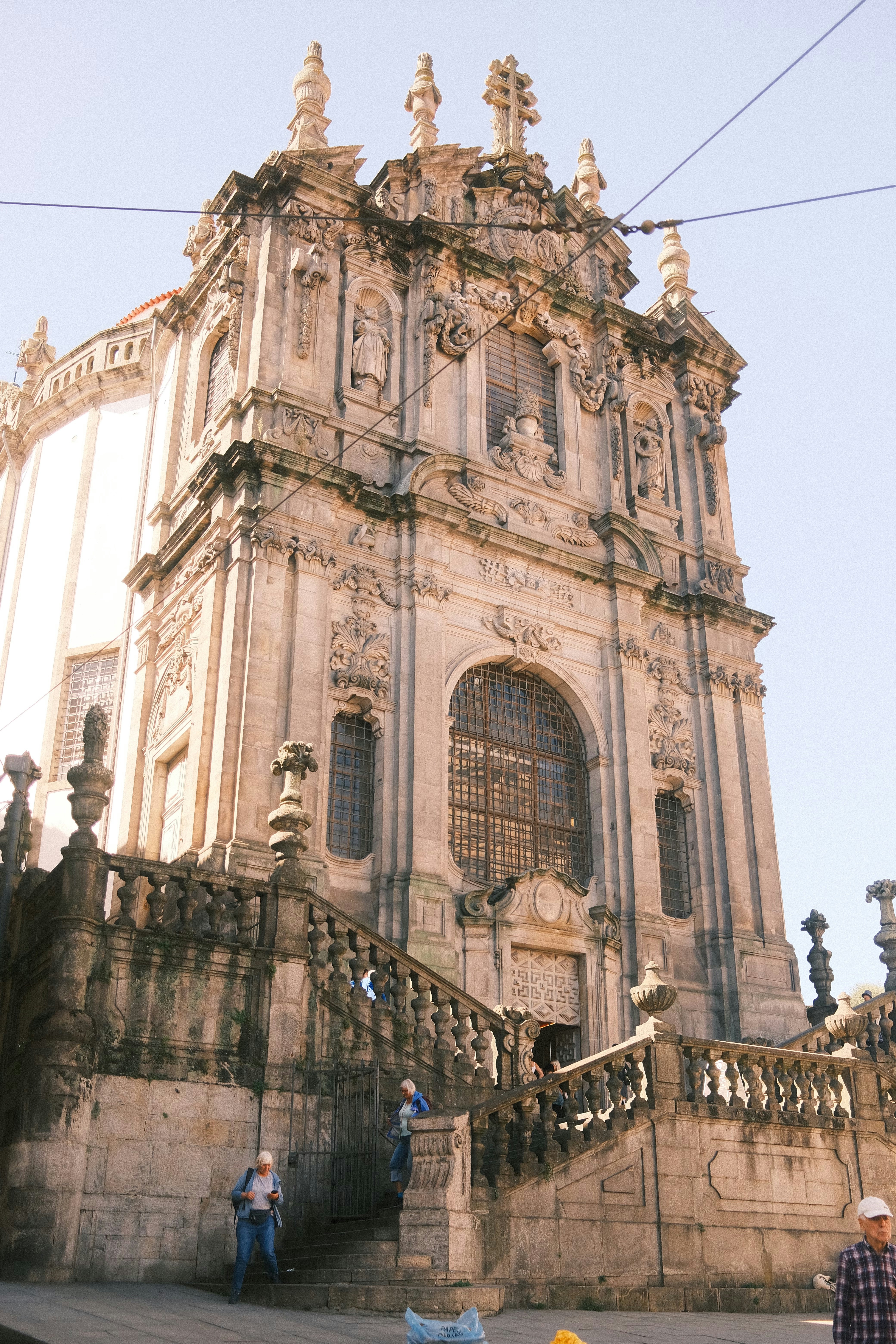 Stone Carved Grandeur: Baroque Facade Framed by a Grand Staircase