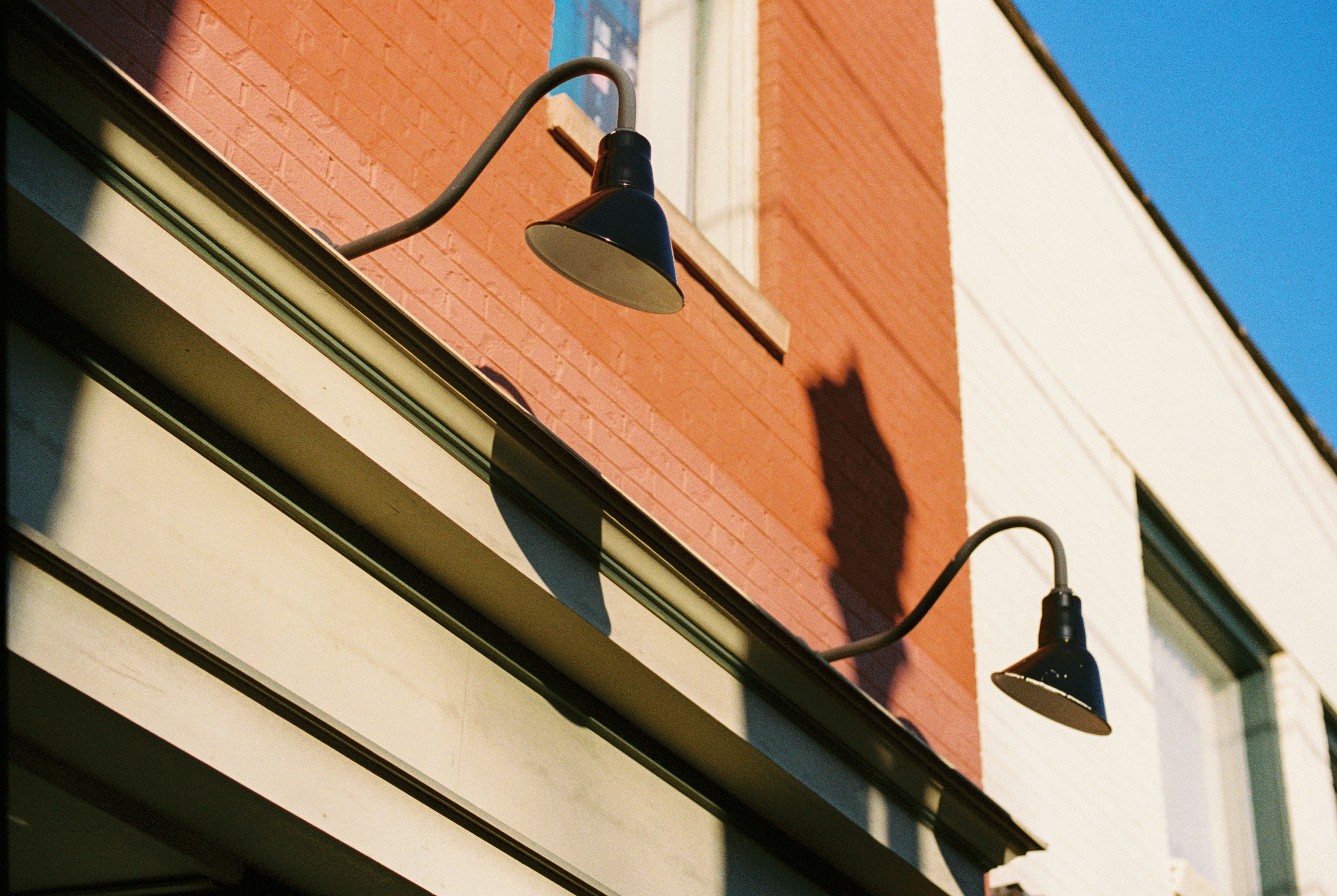 A street light on the side of a building photo – Free Pittsburgh Image ...