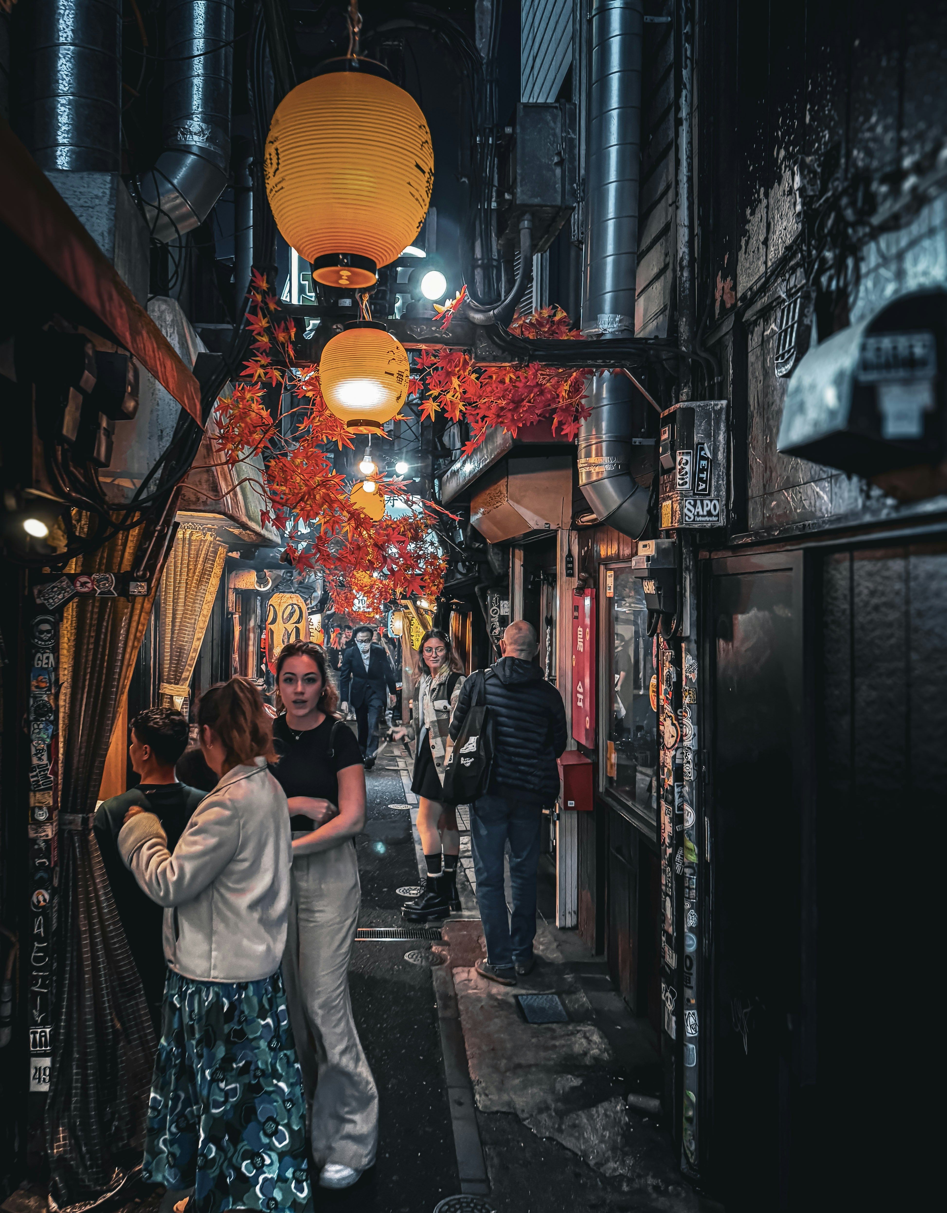 Autumn Lantern Alley: Quiet Crowd Beneath Orange Glow