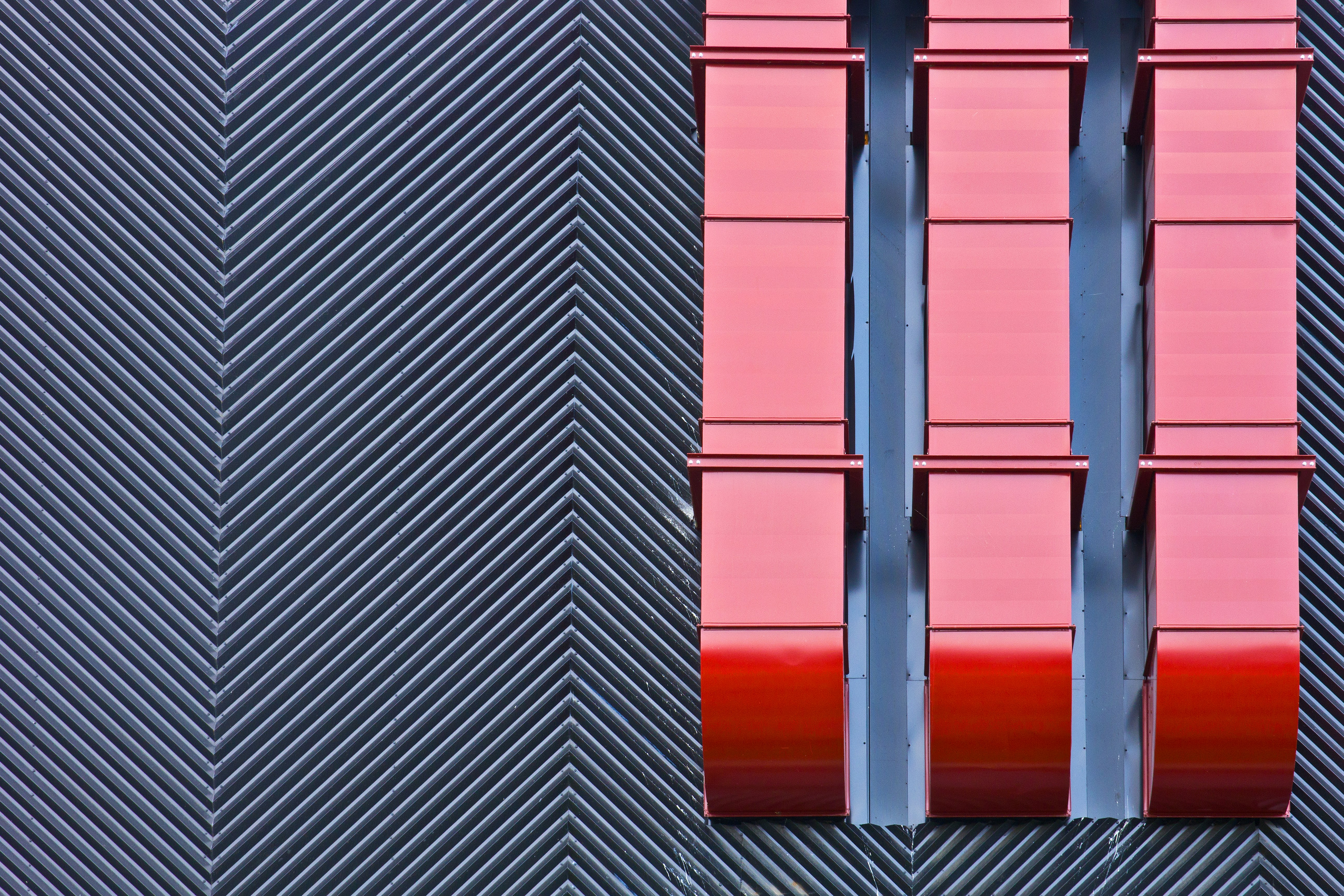 Crimson Ribs Against a Chevron Canvas: A Close-Up Study of Texture