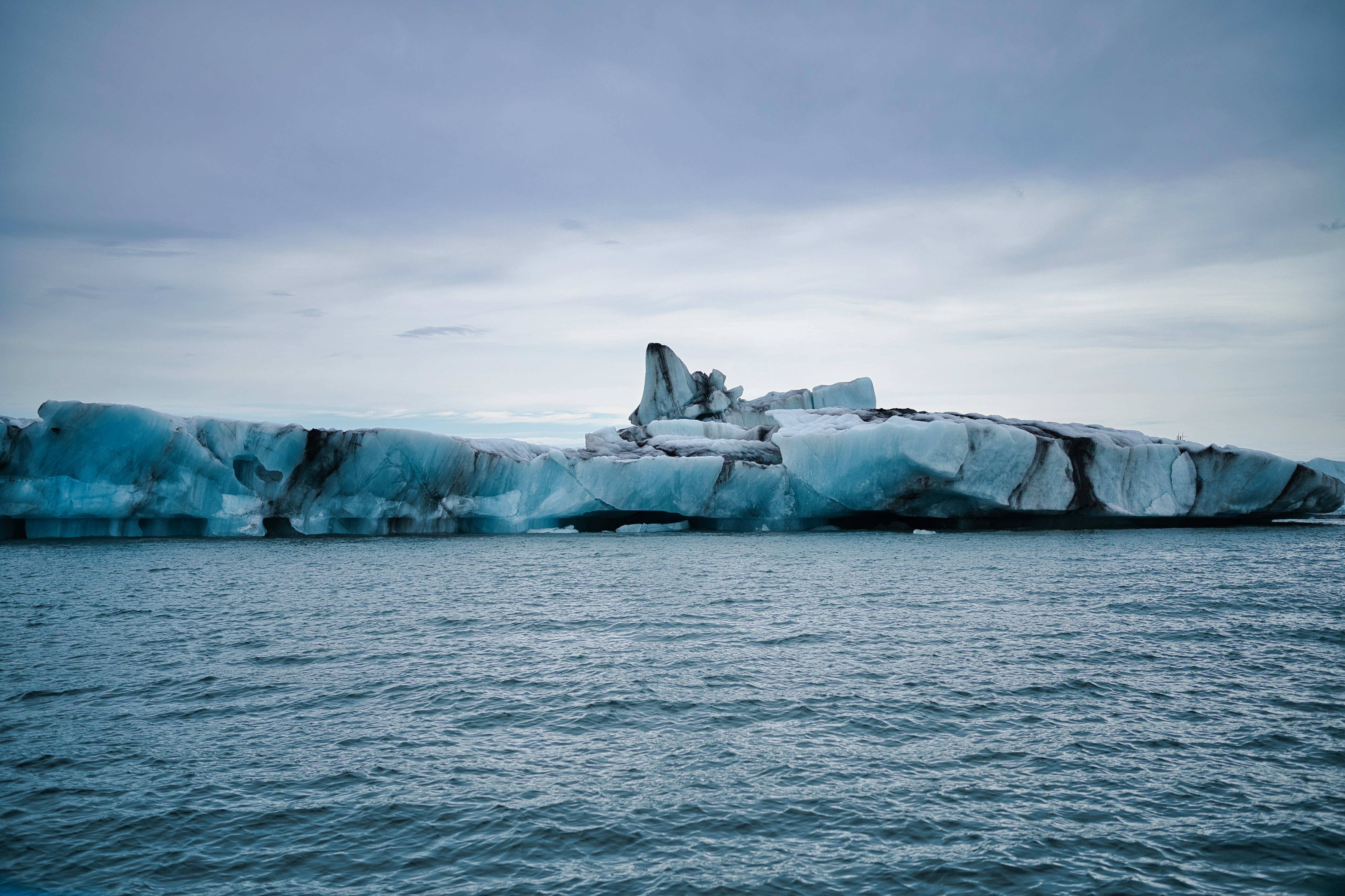 Iceberg Crown Rising Over a Quiet Polar Sea