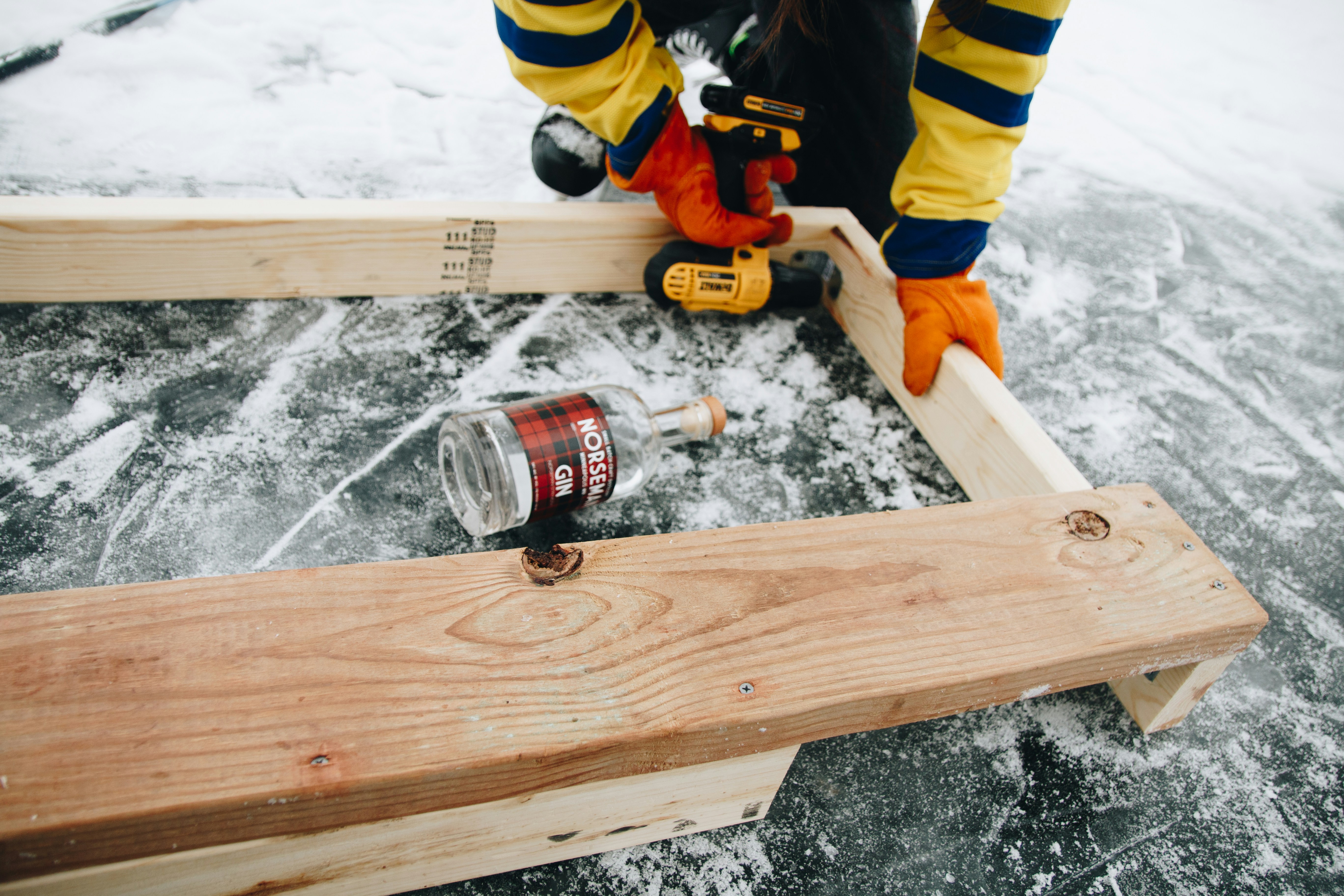Framing in Frost: A Cordless Drill at a Winter Worksite