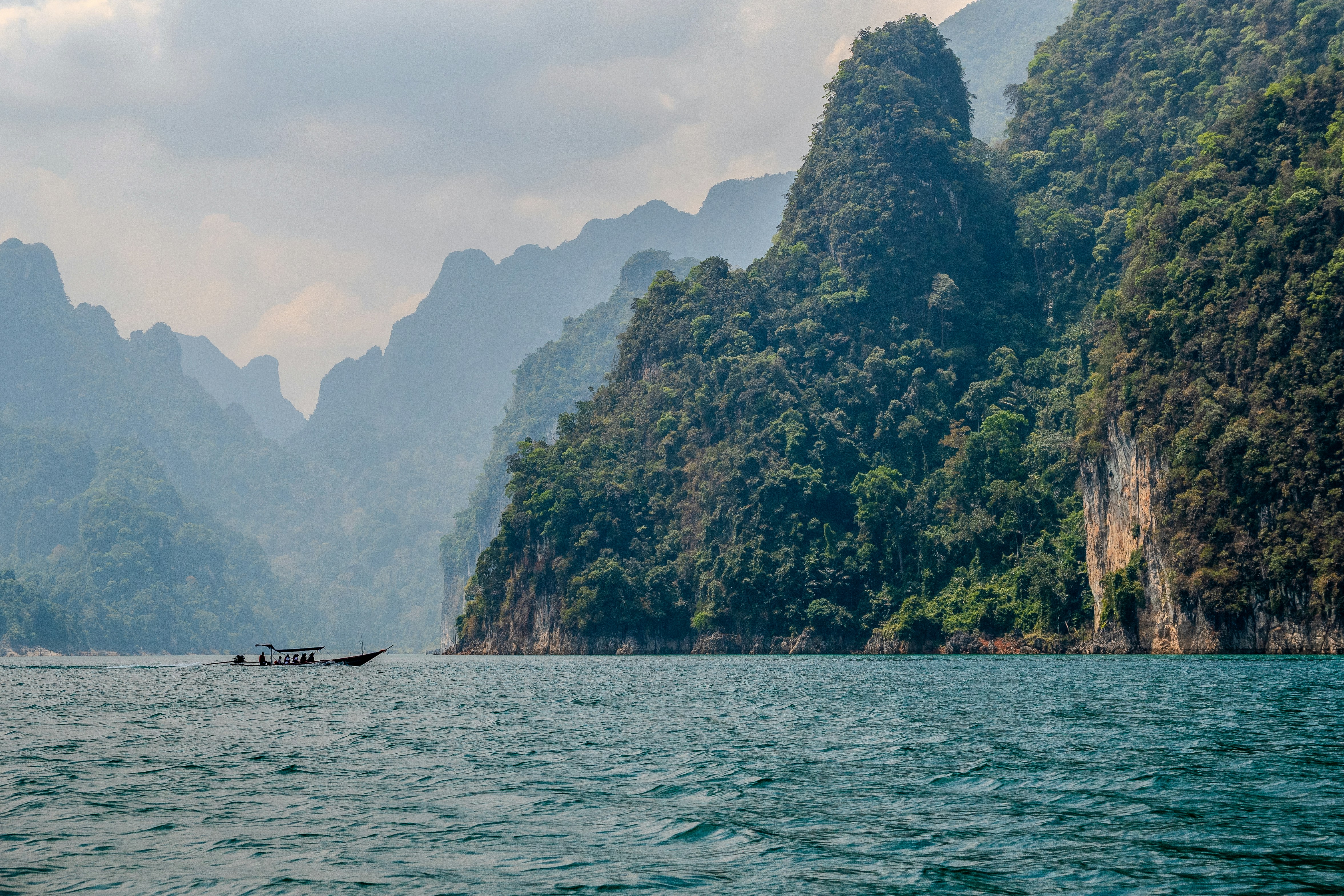 A large body of water surrounded by mountains