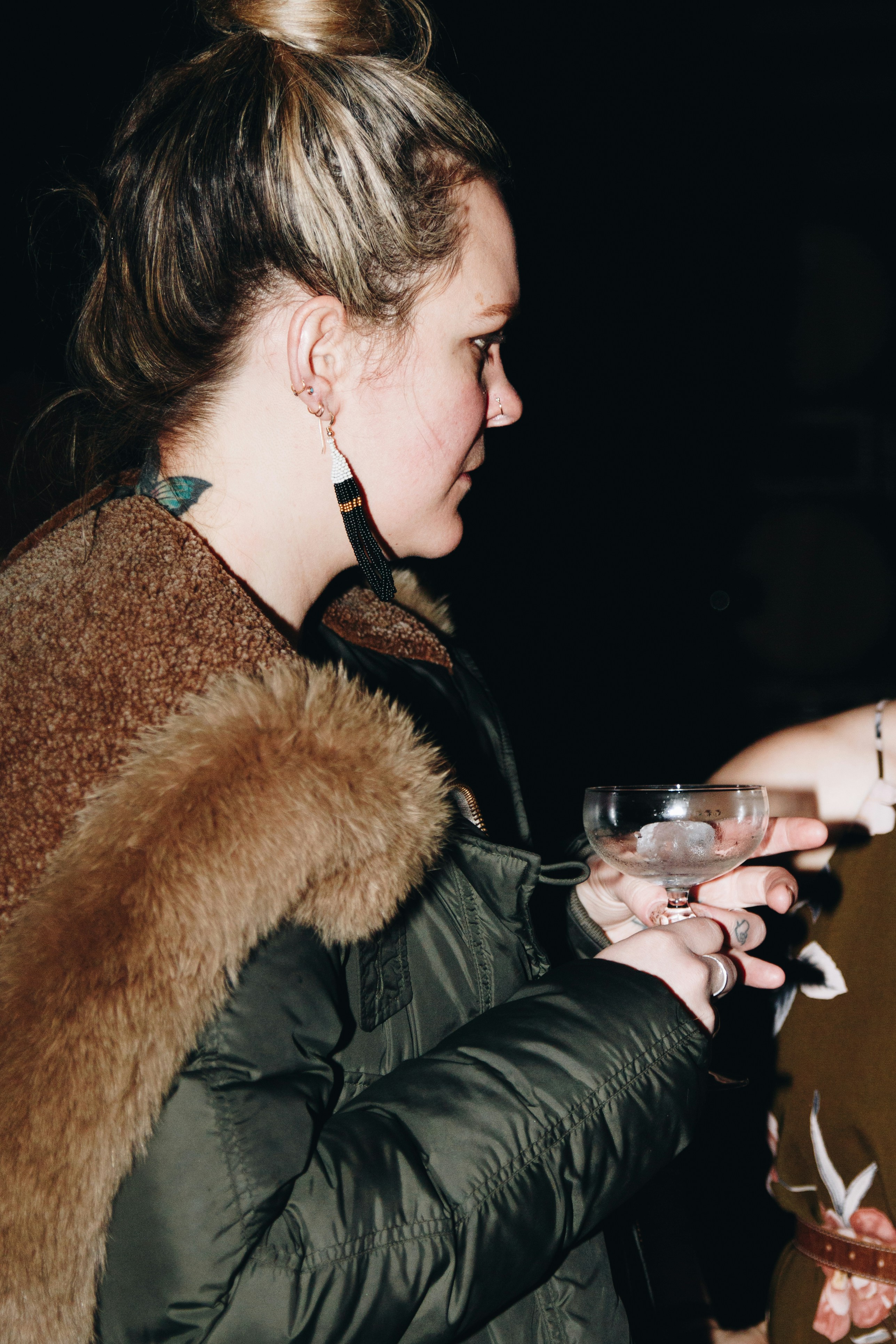 Side-Profile of a drink-in-hand Moment