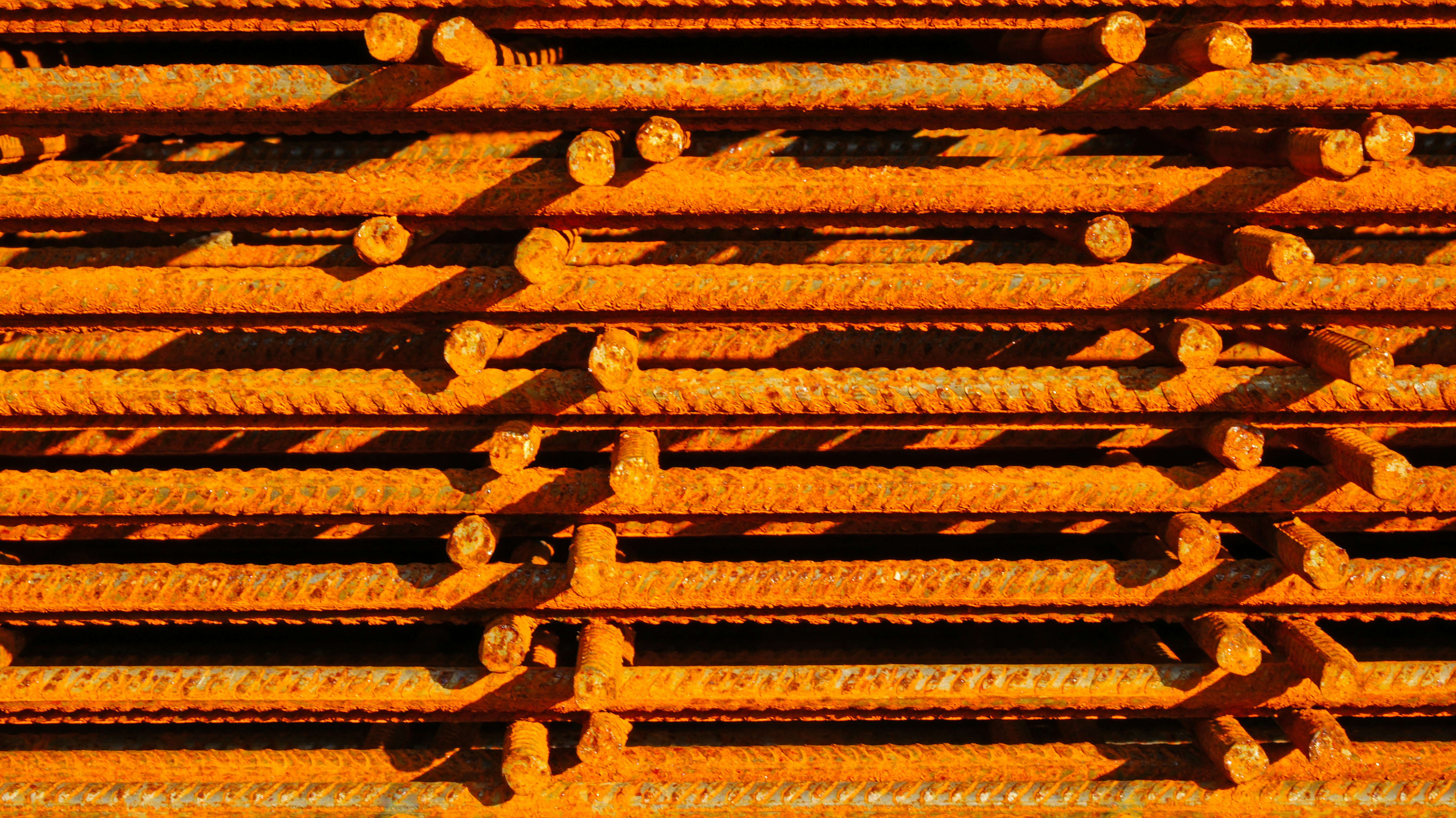 Rhythm of Rust: Sun-Warmed Rebar Grid