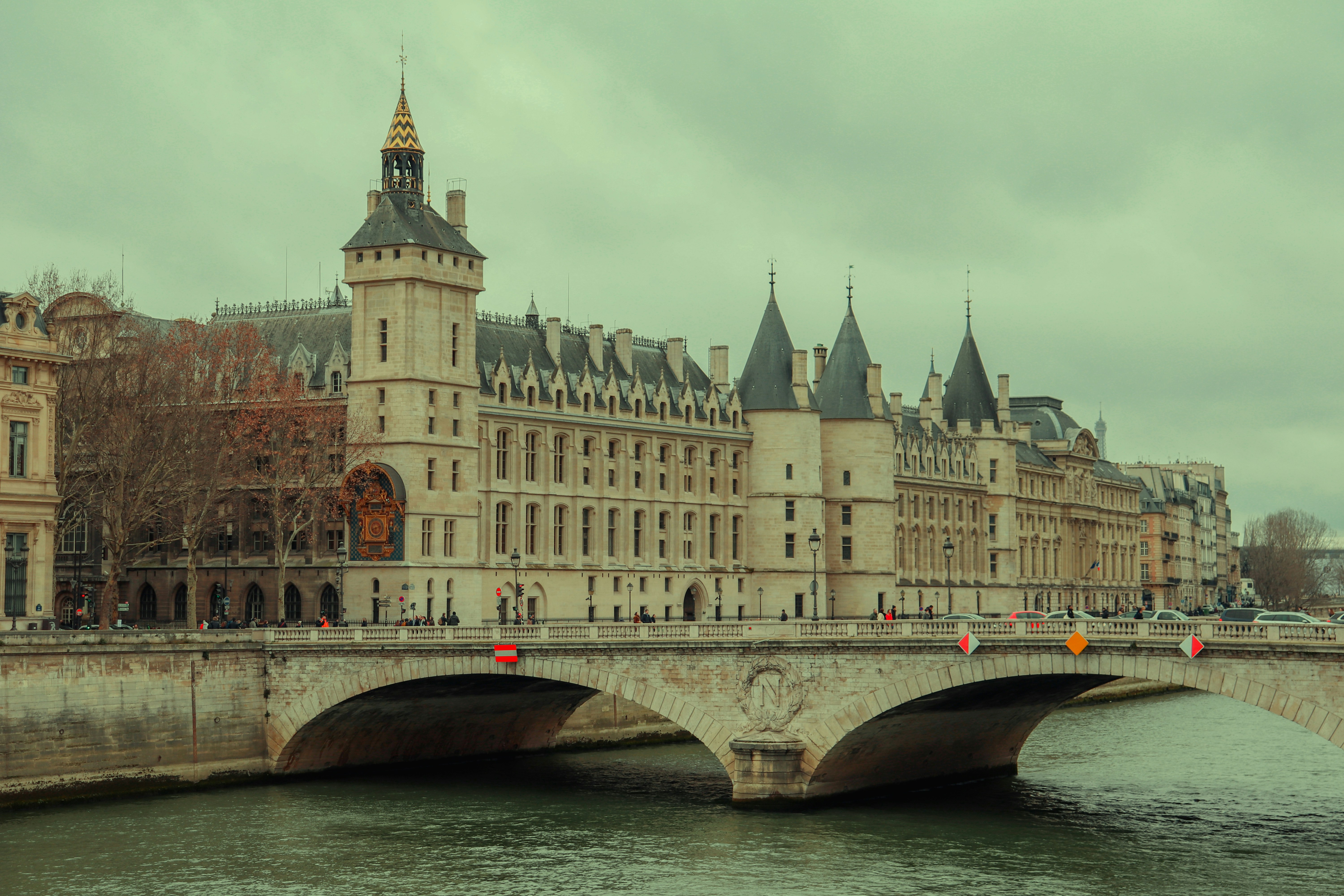 Hôtel de Ville on the Seine: Turrets, Arches, and a Calm Riverside Vista