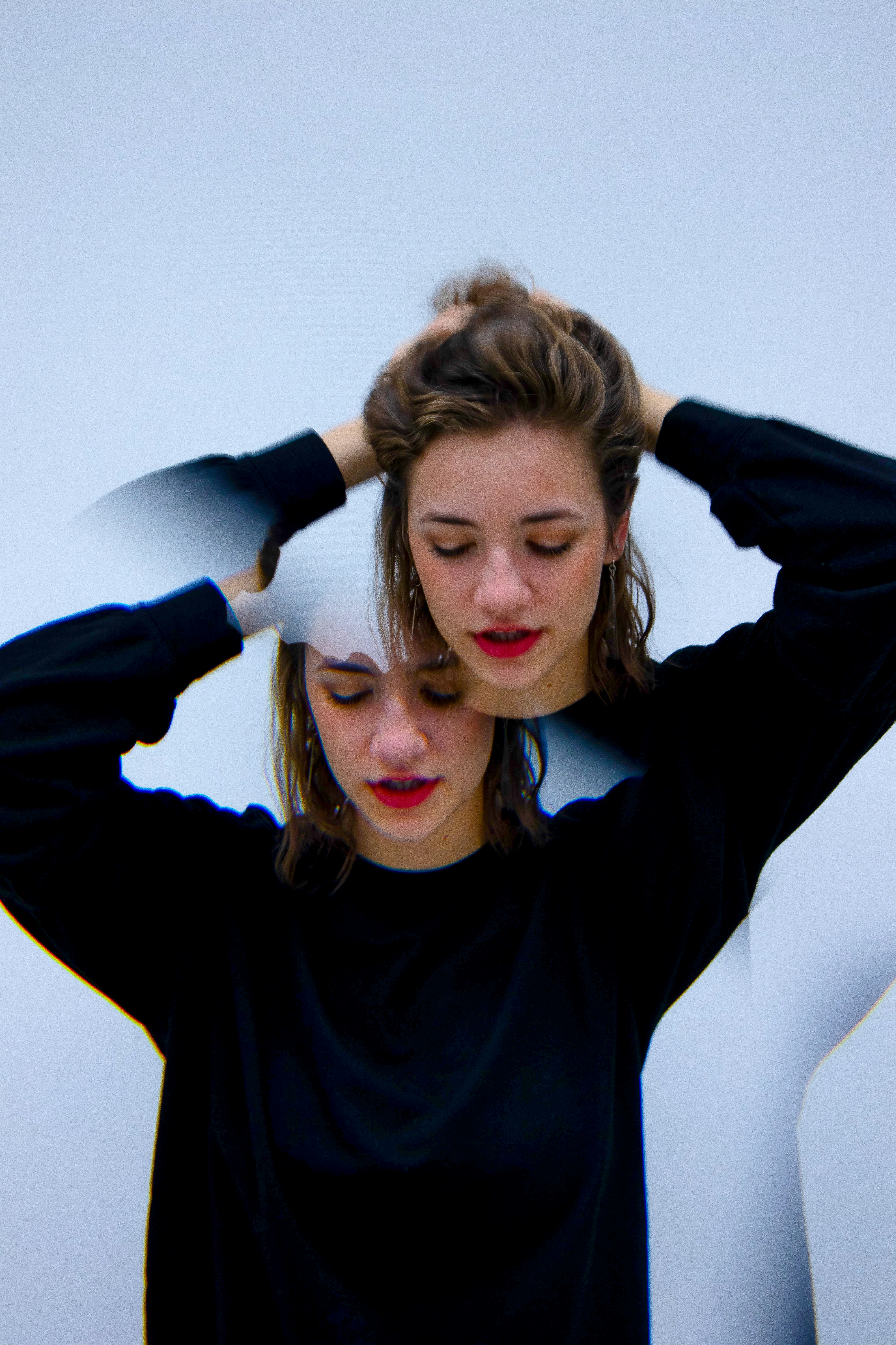 A couple of women standing next to each other photo – Free Thoughtful ...