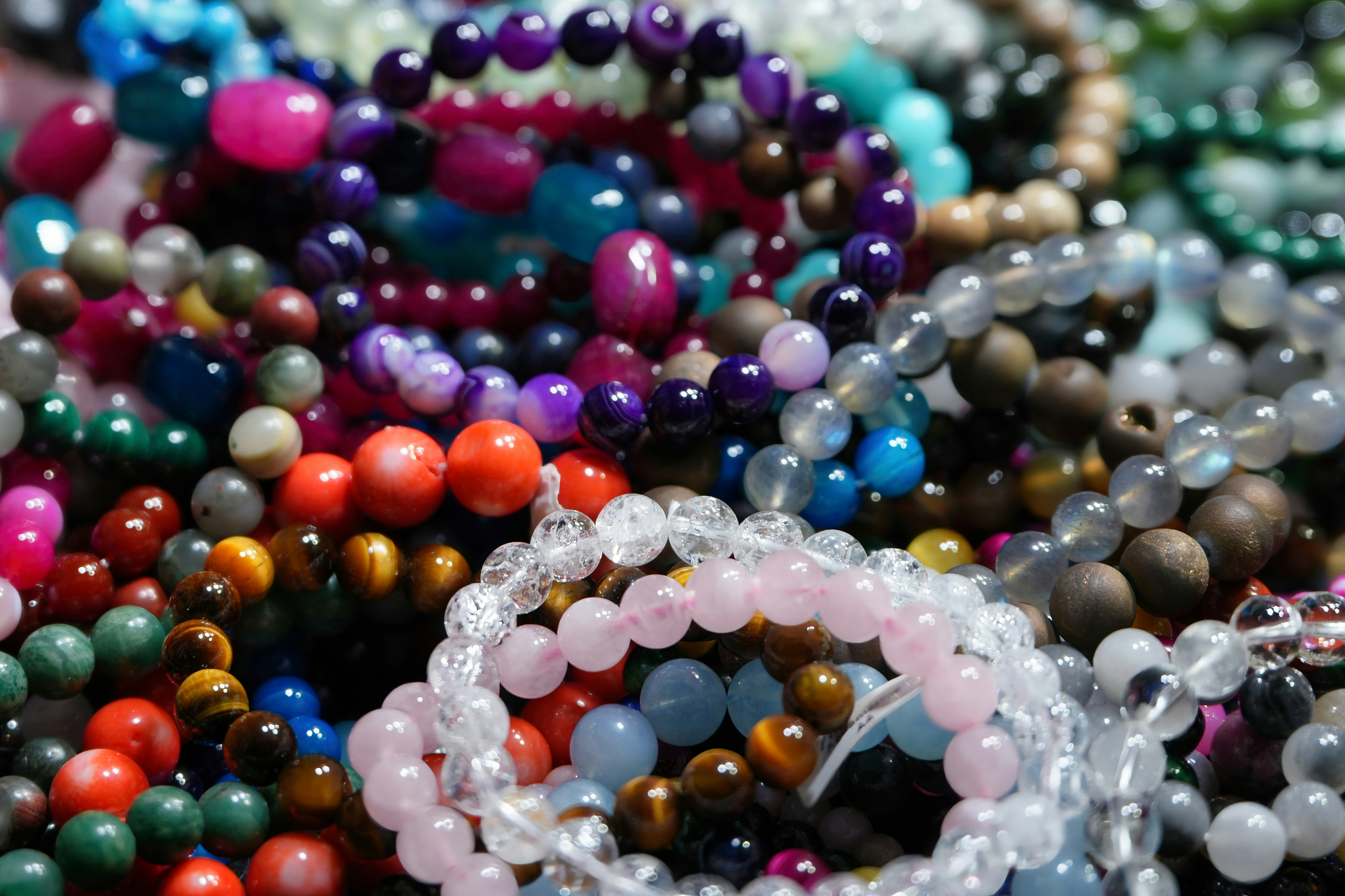 A close up of a bunch of beads photo – Free Poland Image on Unsplash