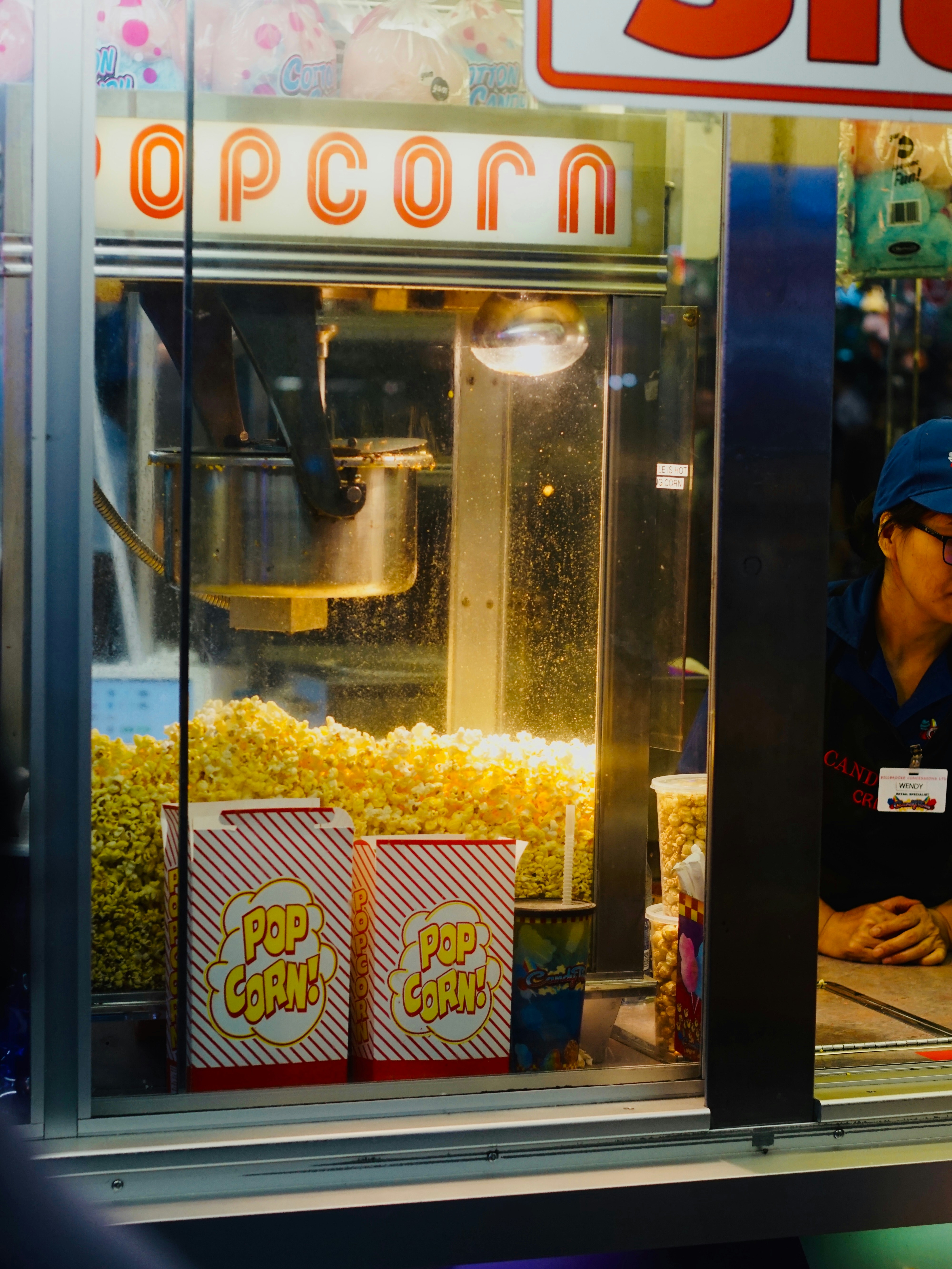 Glass-Front Popcorn Stand: Neon Glow and Striped Boxes