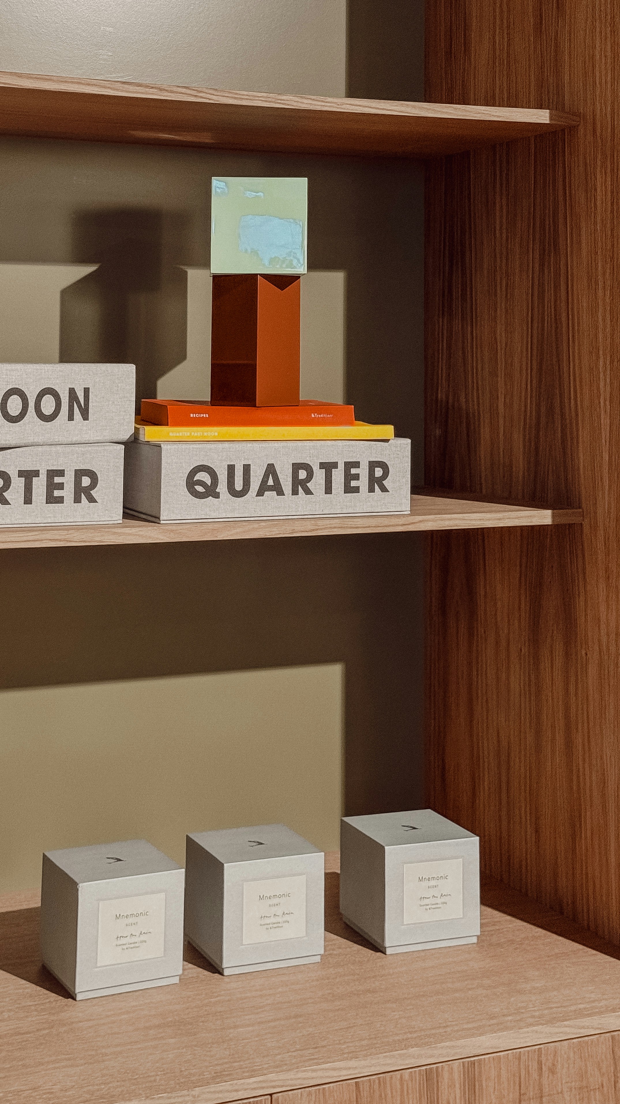 A shelf with a couple of boxes on top of it photo – Free Furniture ...