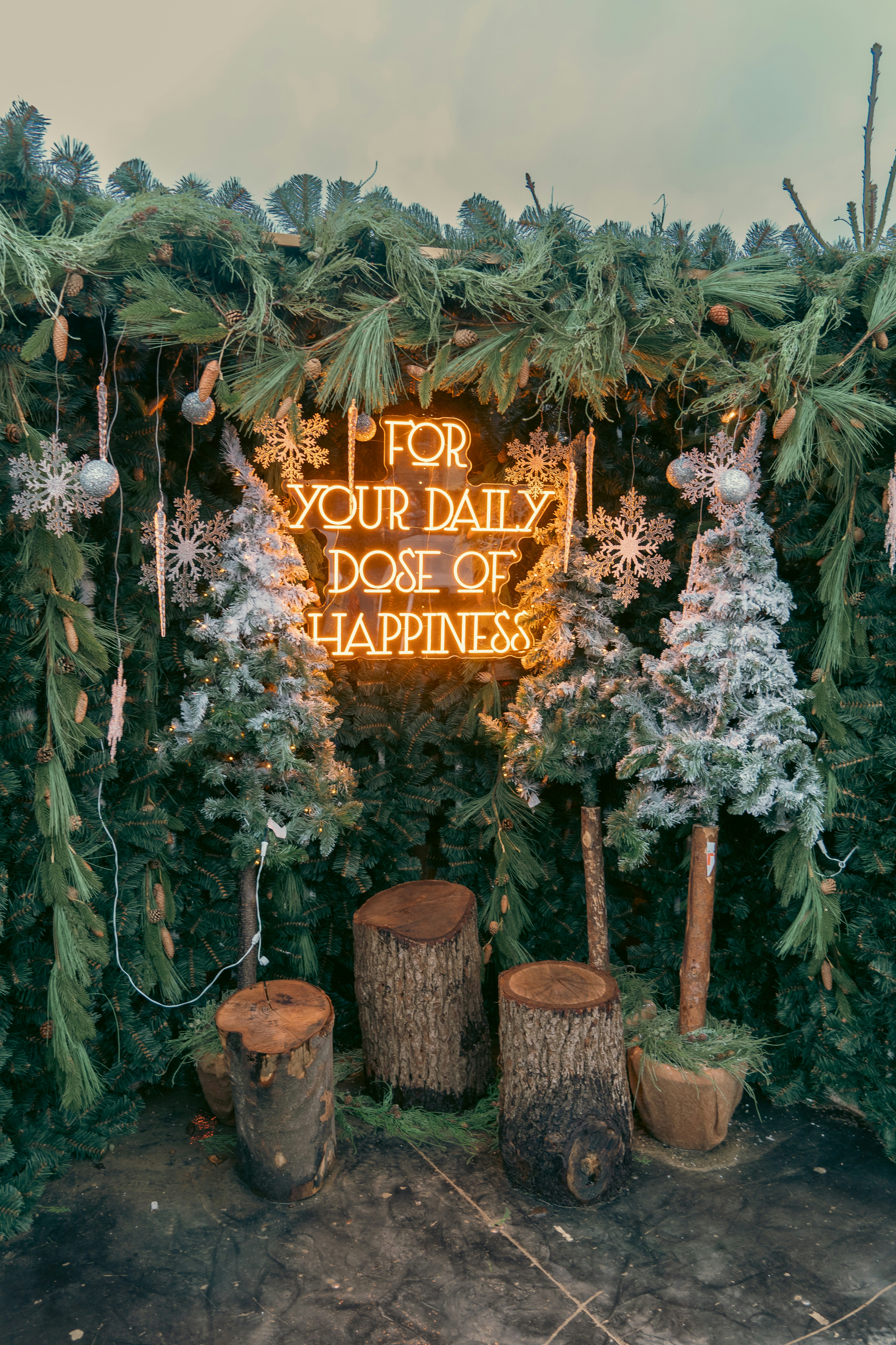 A sign that says for your daily dose of happiness