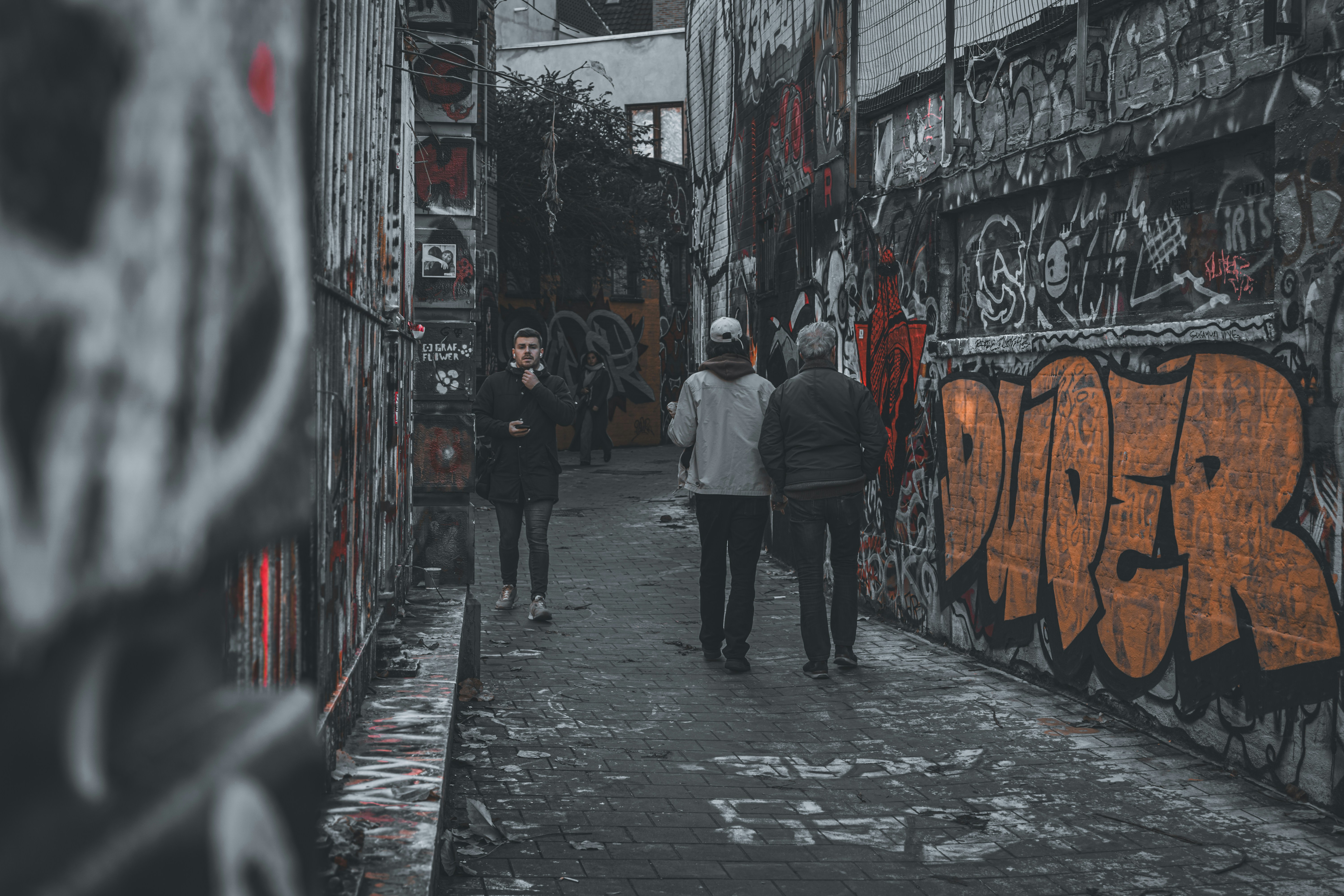 A couple of people that are walking down a streetMustafa Turhan