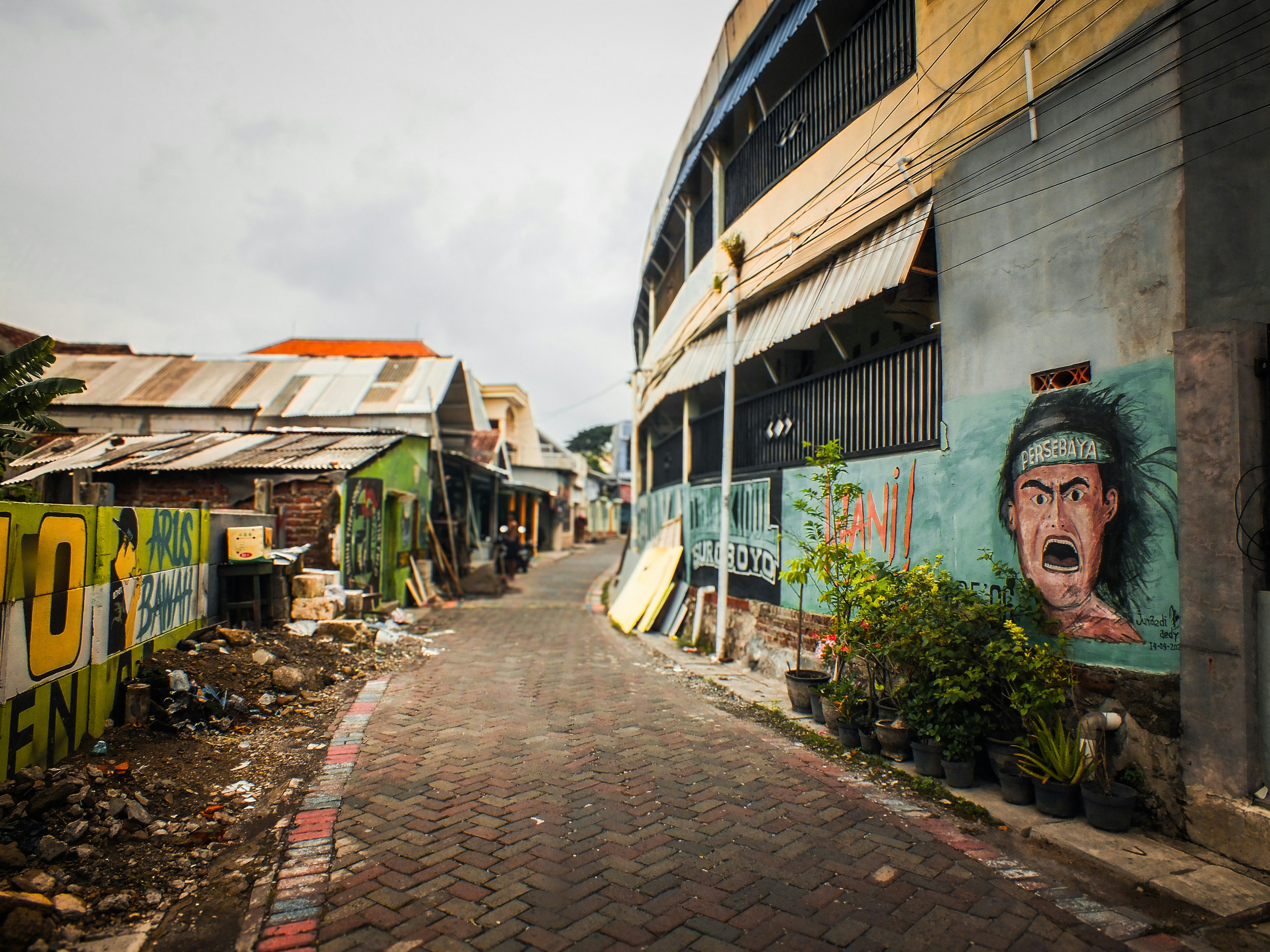 A painting of a man on the side of a building