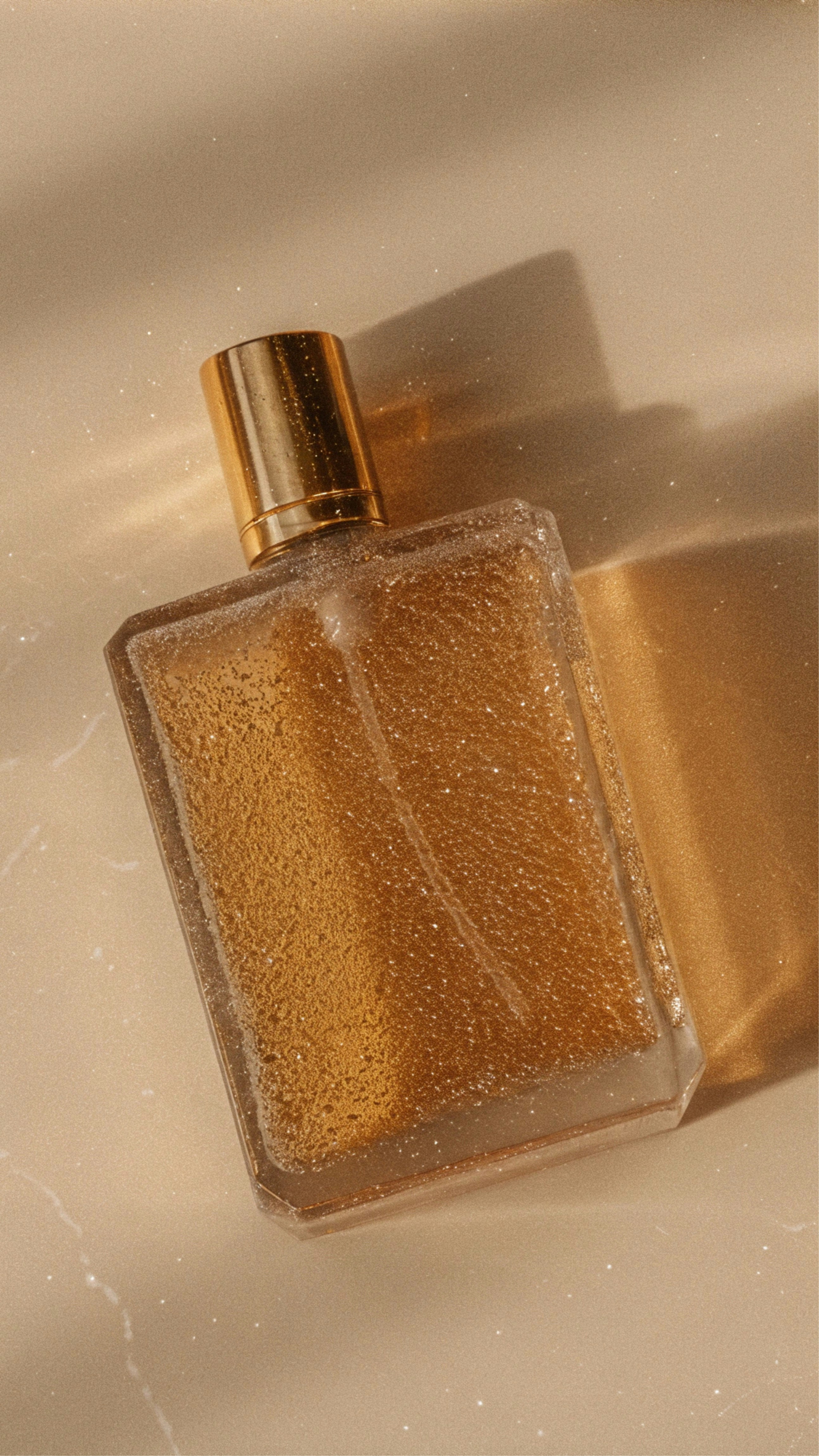 A bottle of perfume sitting on top of a counter photo – Free Texture ...