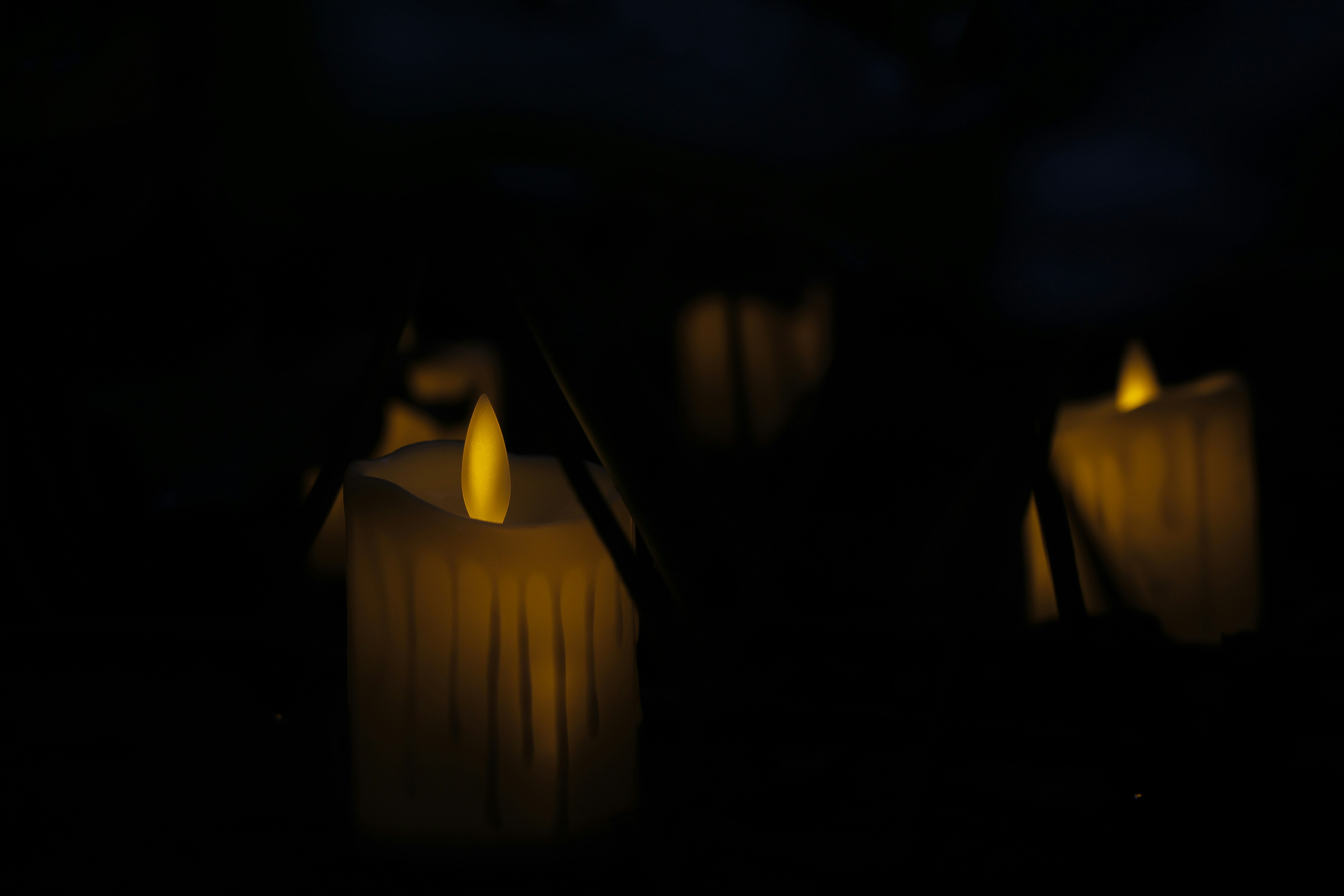 Whispering Flame in Velvet Darkness