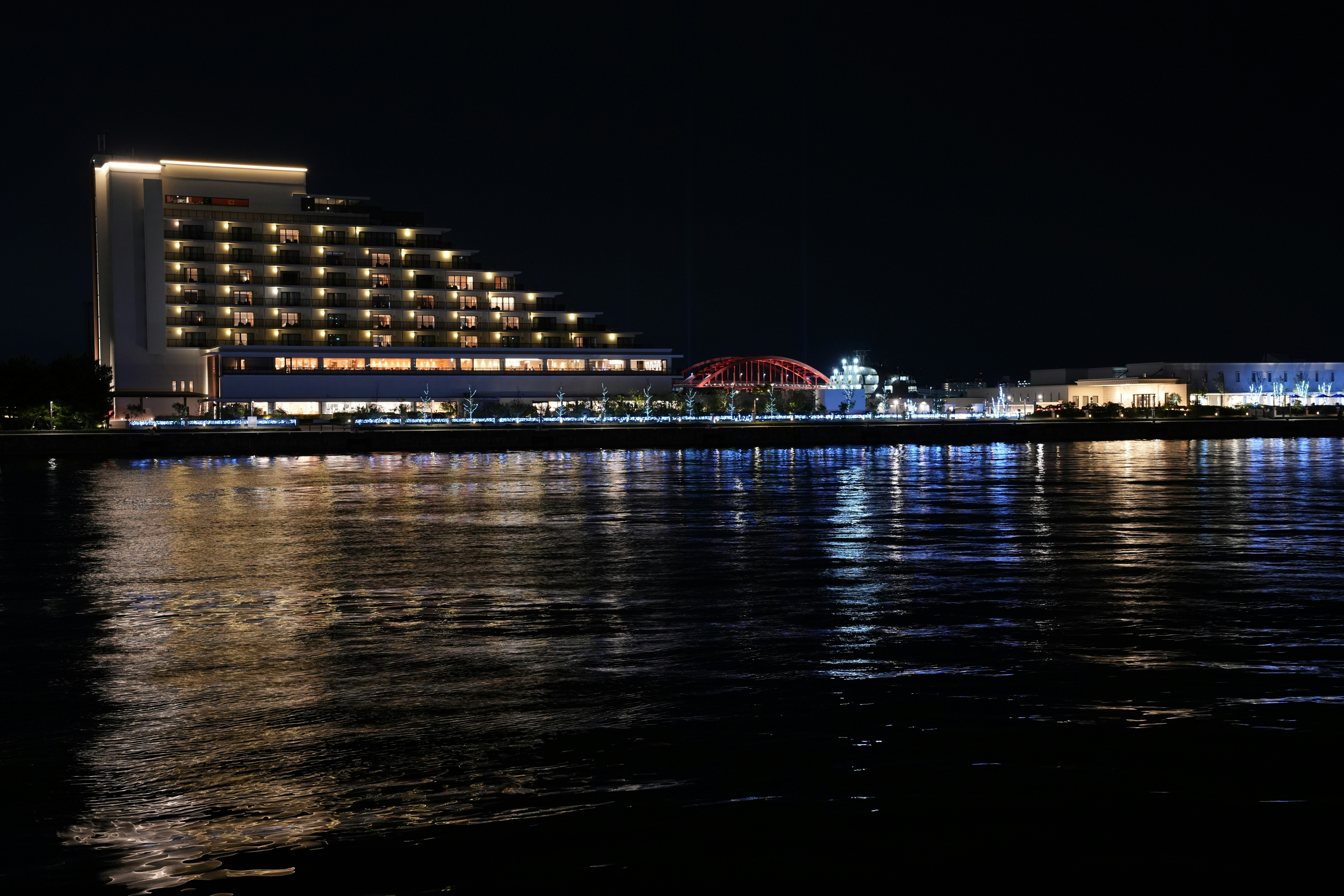 Reflections of Urban Serenity: A Night by the Water