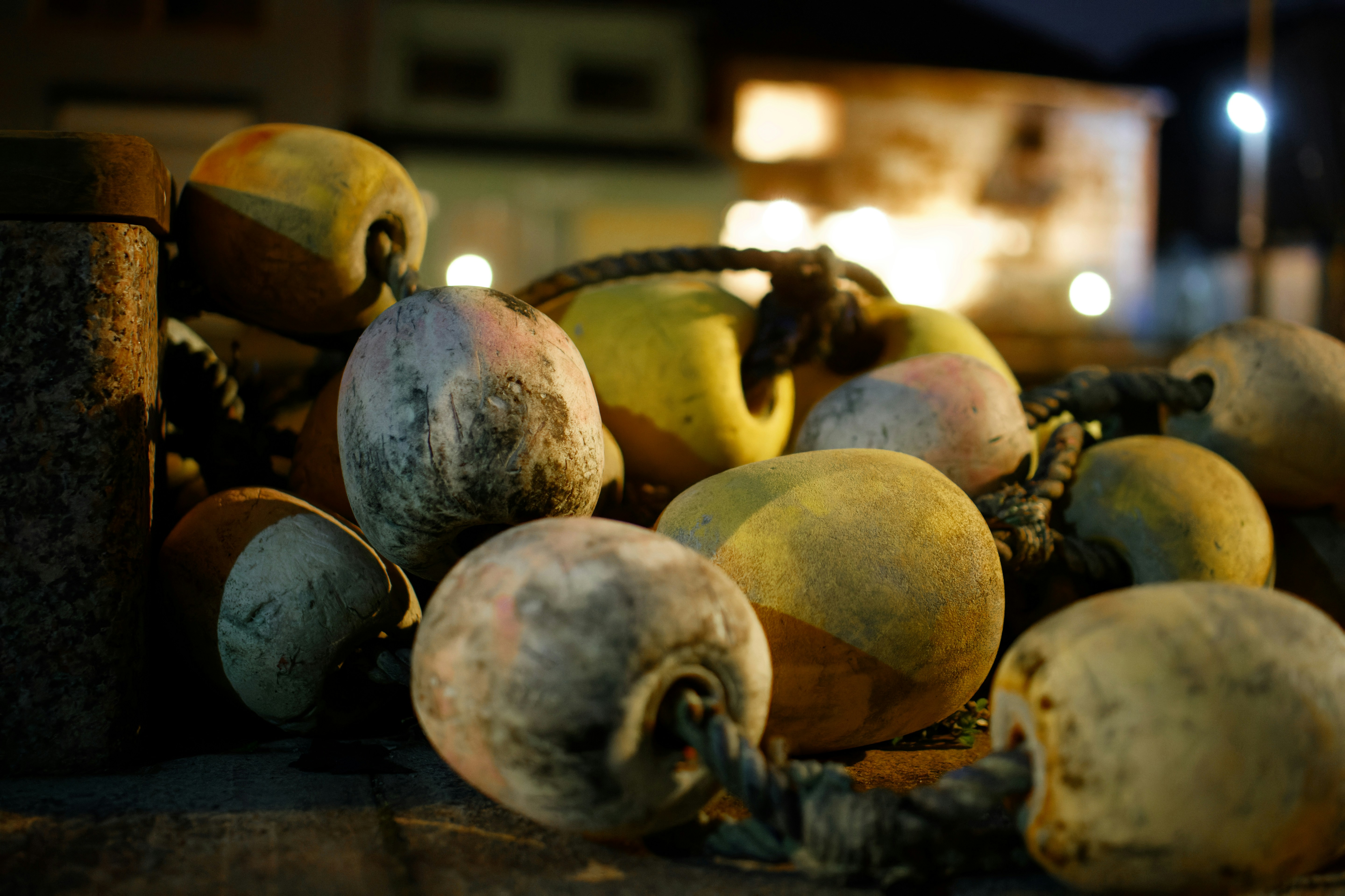 Nightbound Buoys: Weathered Spheres on a Quiet Dock