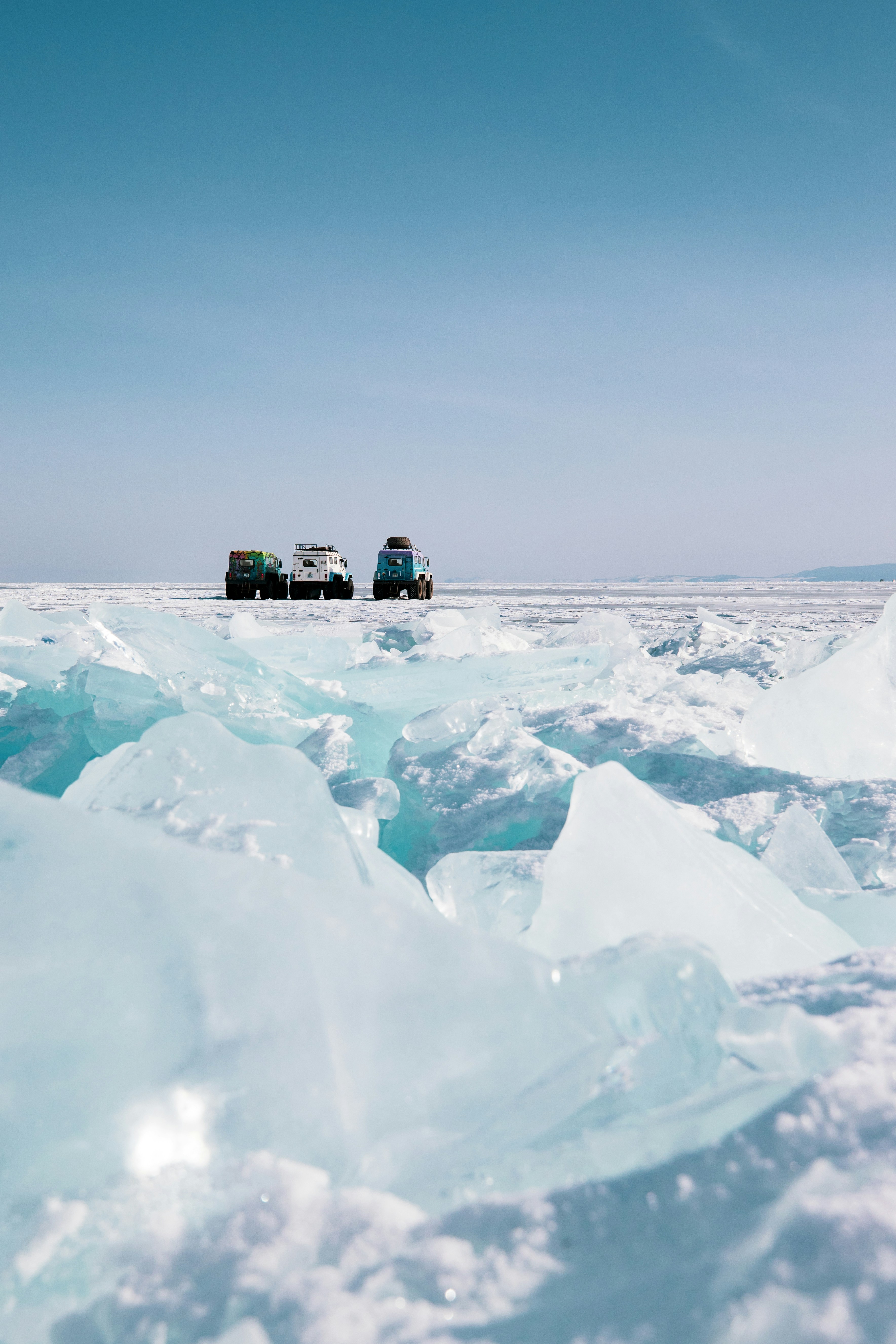 Ice Road Convoy: A Trio of Explorers Crossing a Frozen Sea