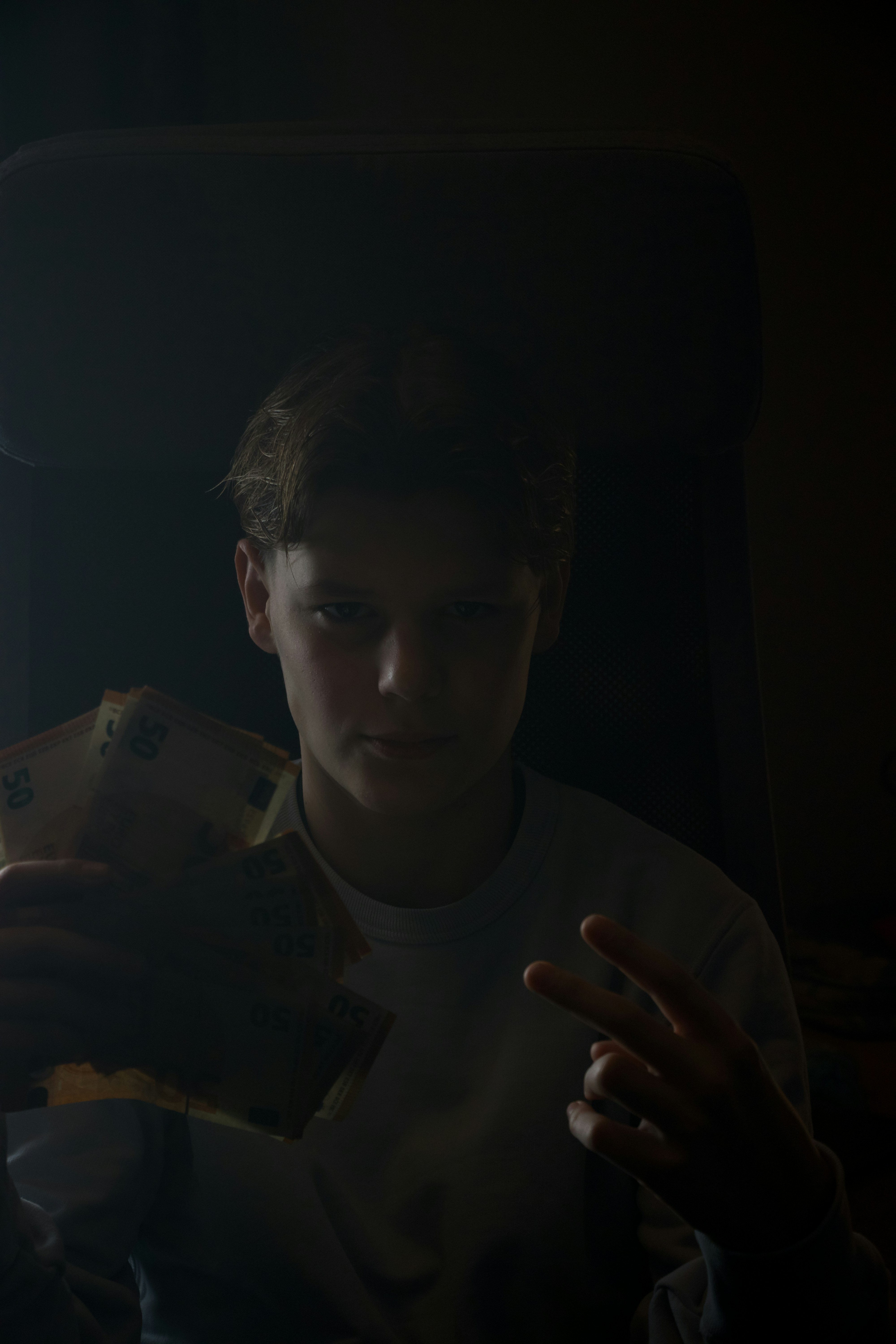 Shadows of Ambition: A Young Hustler's Moment