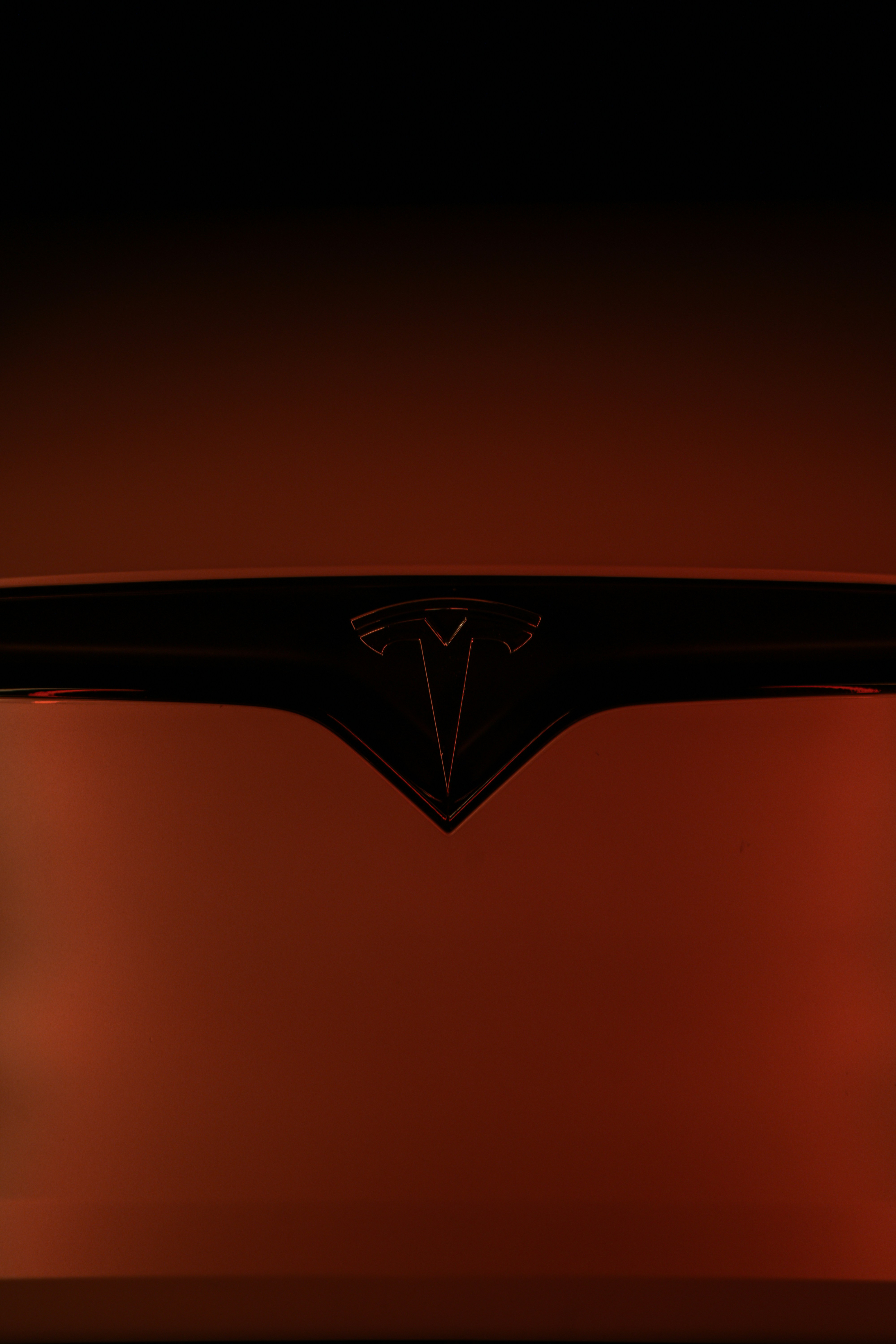Silhouette of Innovation in Fiery Glow