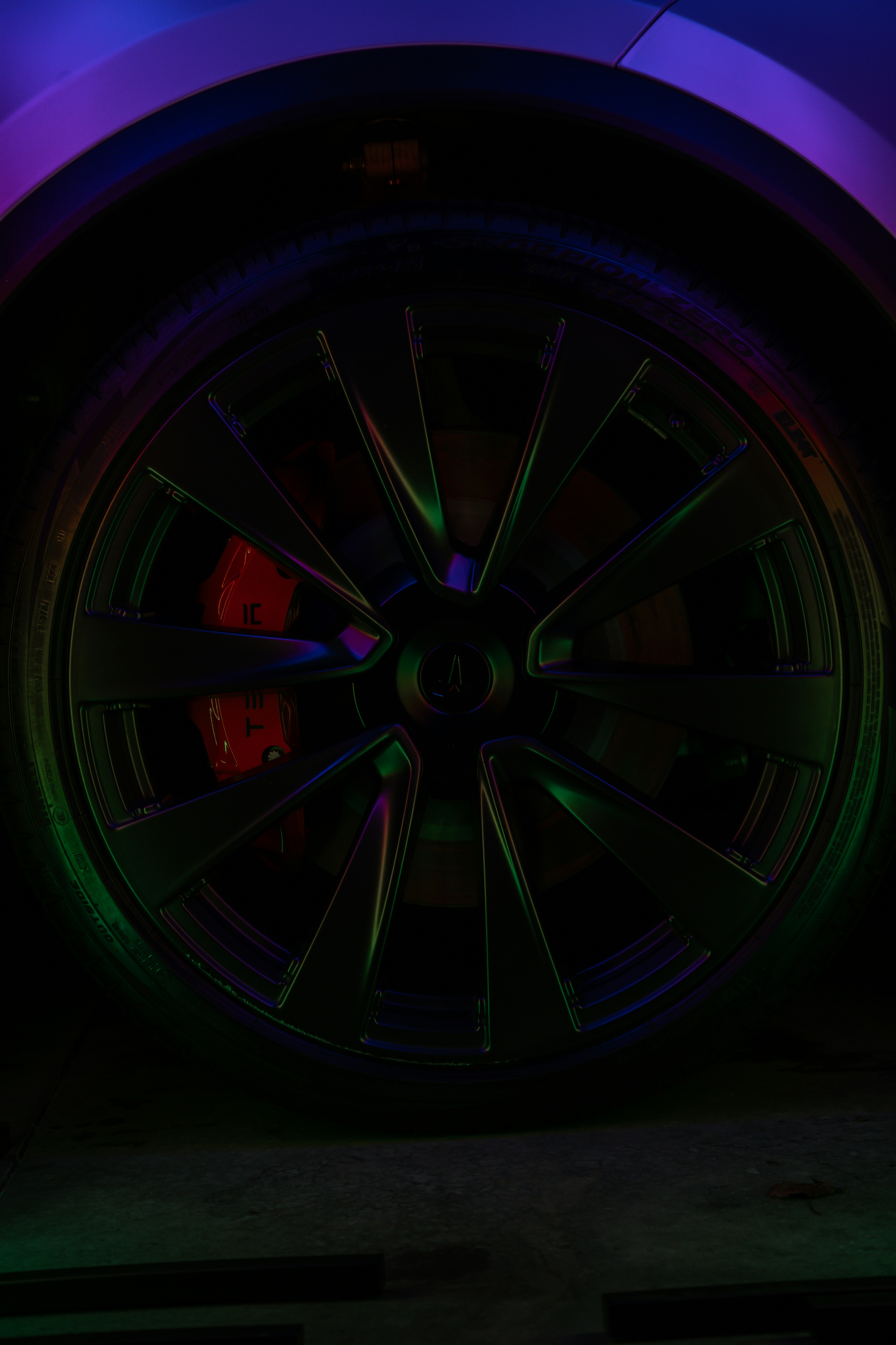A wheel of a car in a dark room photo – Free Atlanta Image on Unsplash