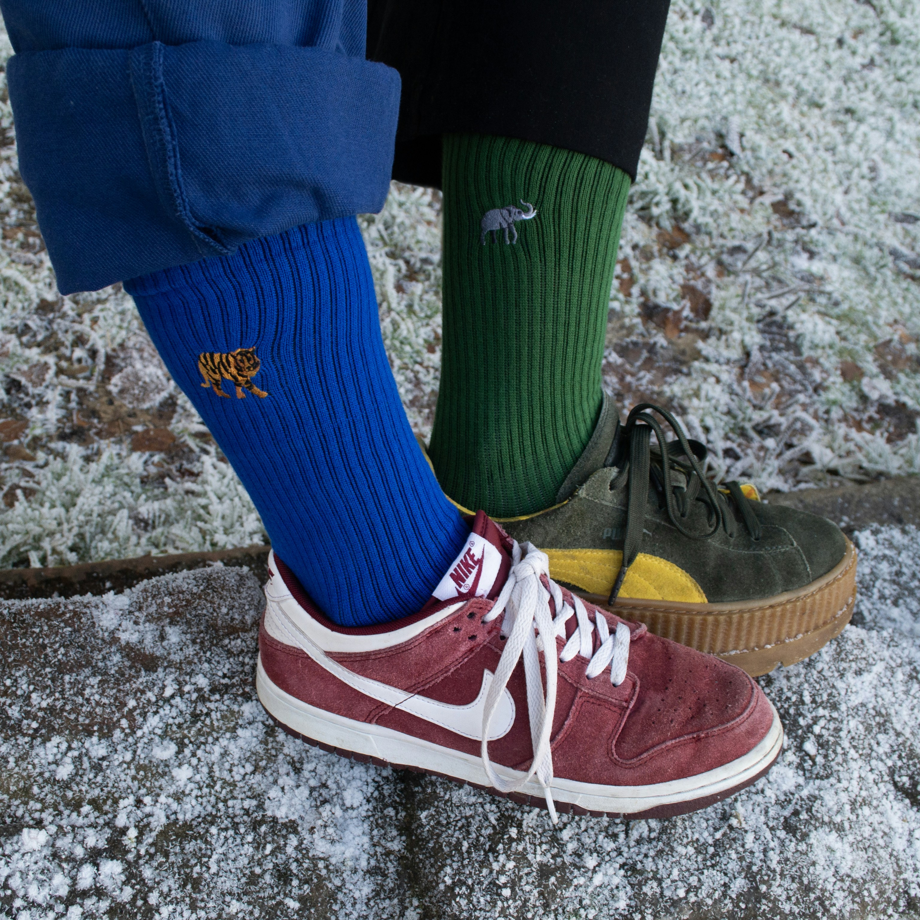 A pair of feet wearing colorful socks and shoes photo – Free Socks ...