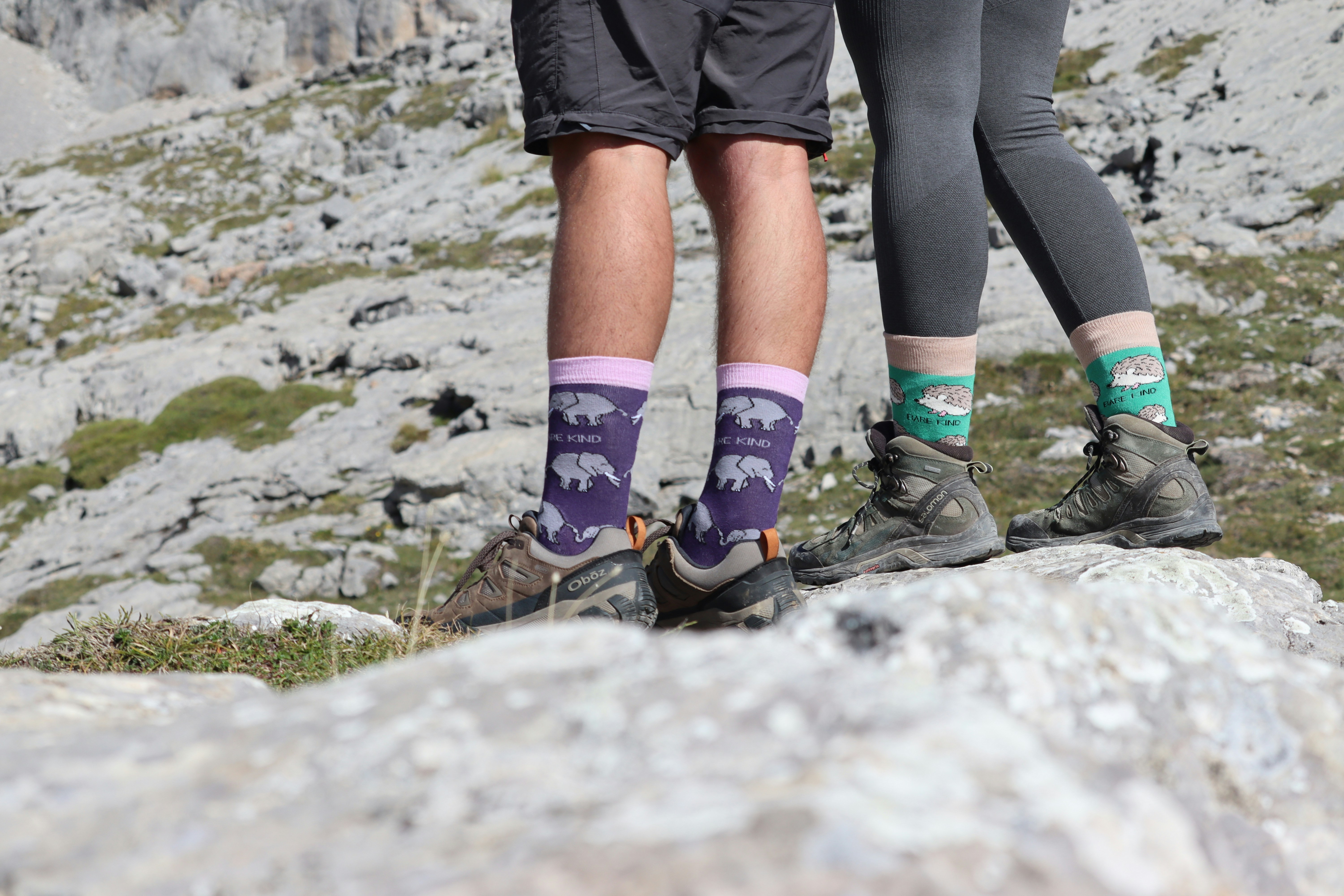 Hidden hikers: contrasting socks on a rocky trail