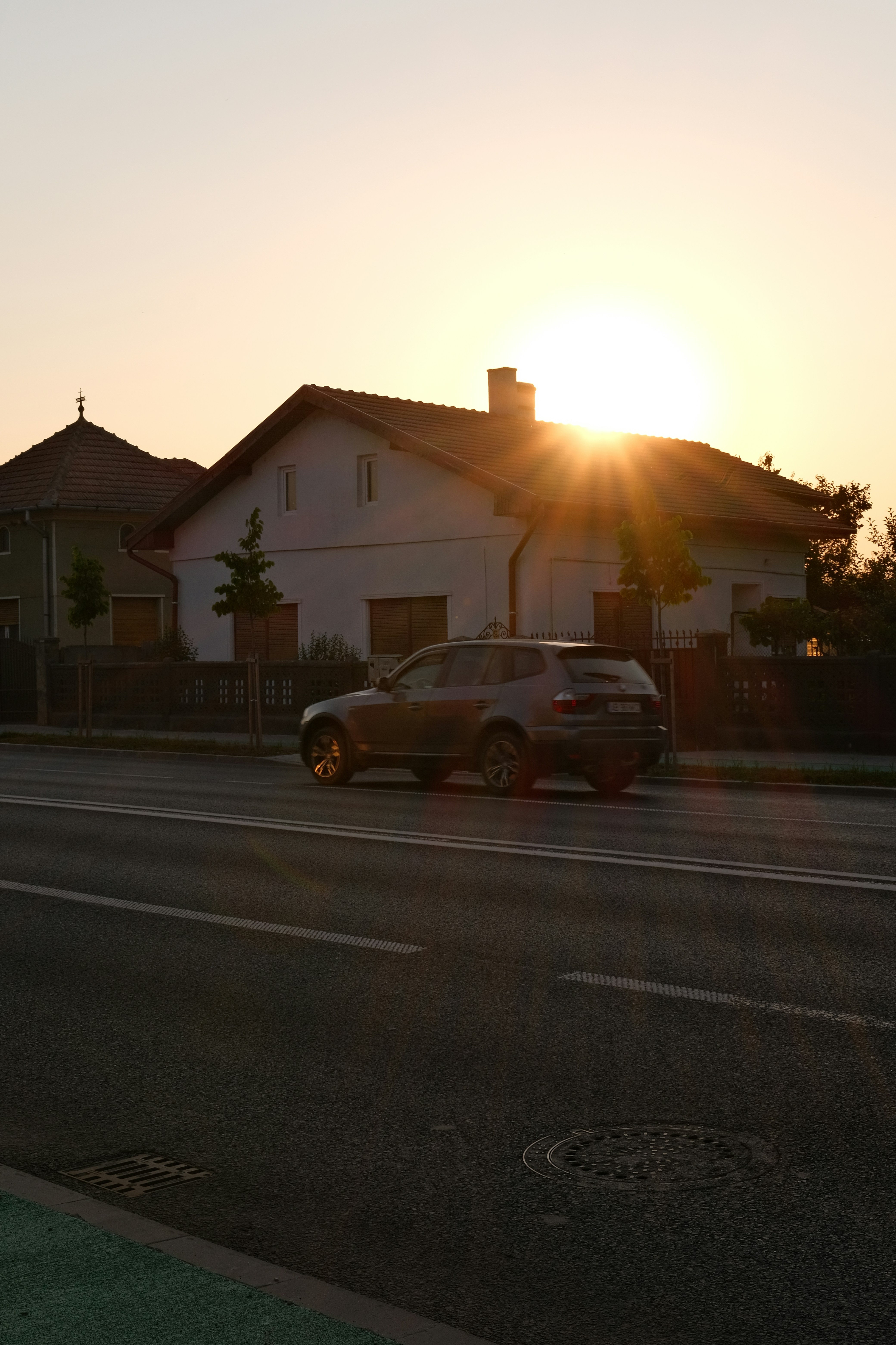 Sunset Drive by Suburban Houses