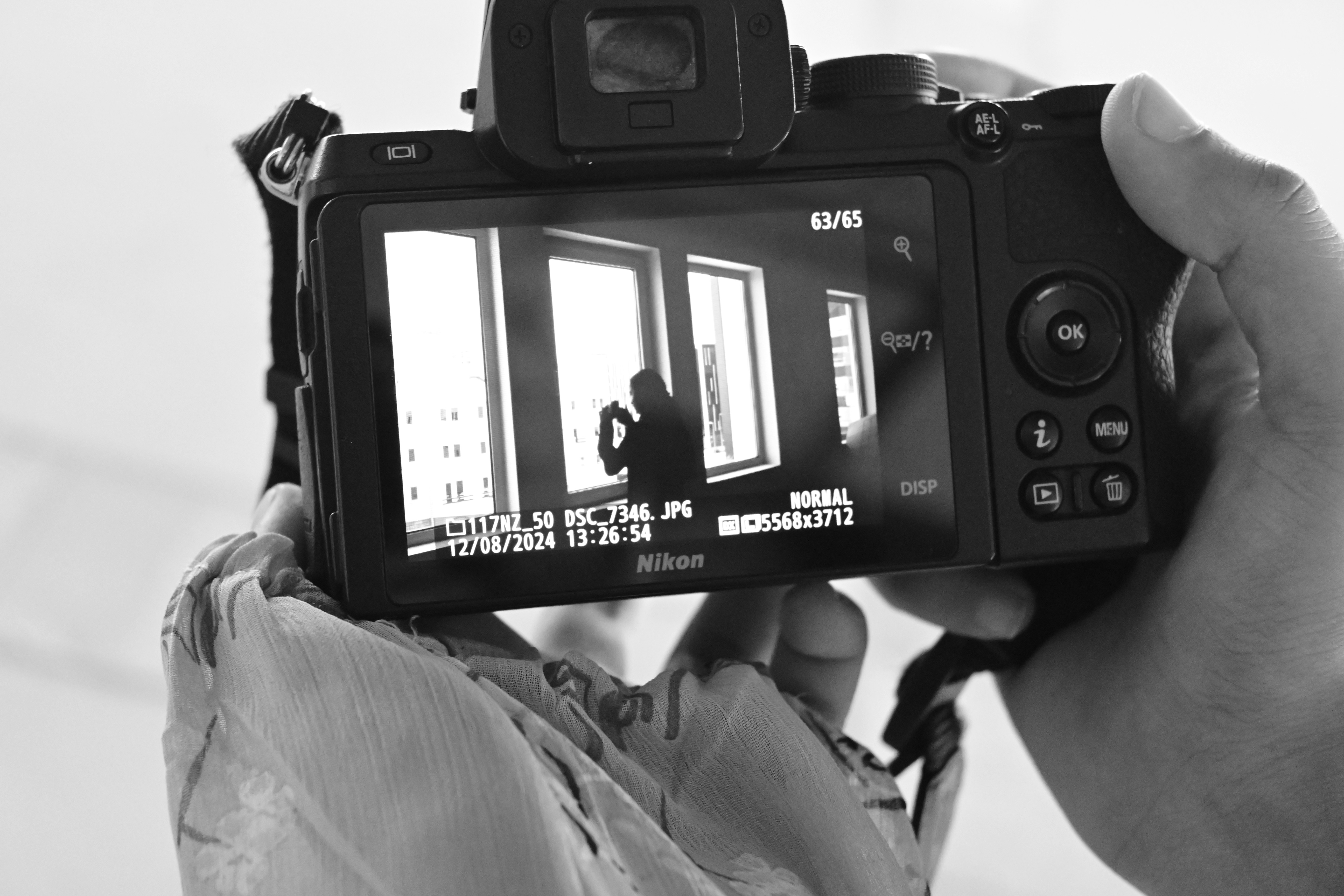 Through the Lens: A Portrait Within a Portrait