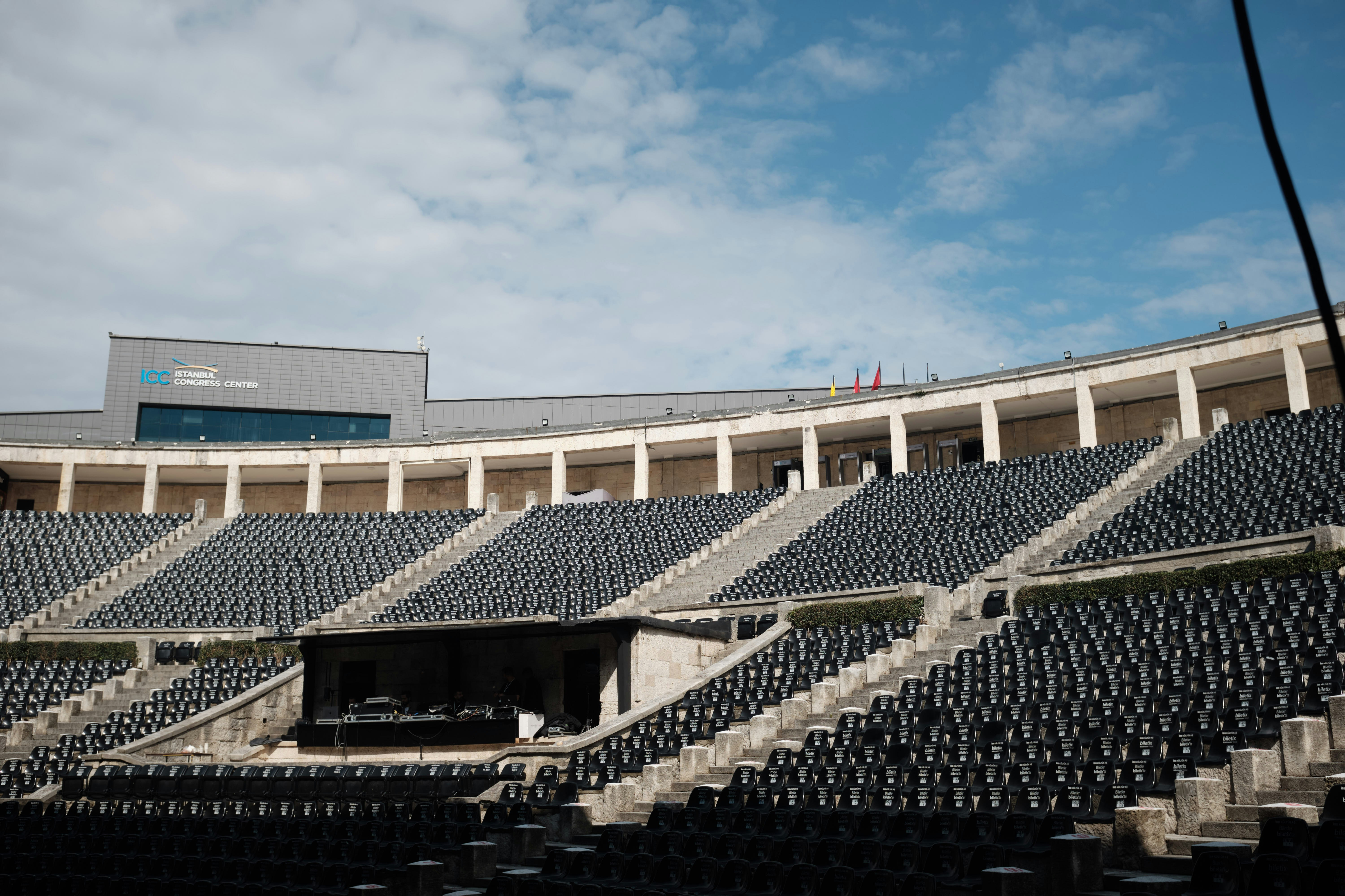 A large empty stadium filled with lots of seats photo – Free Building ...