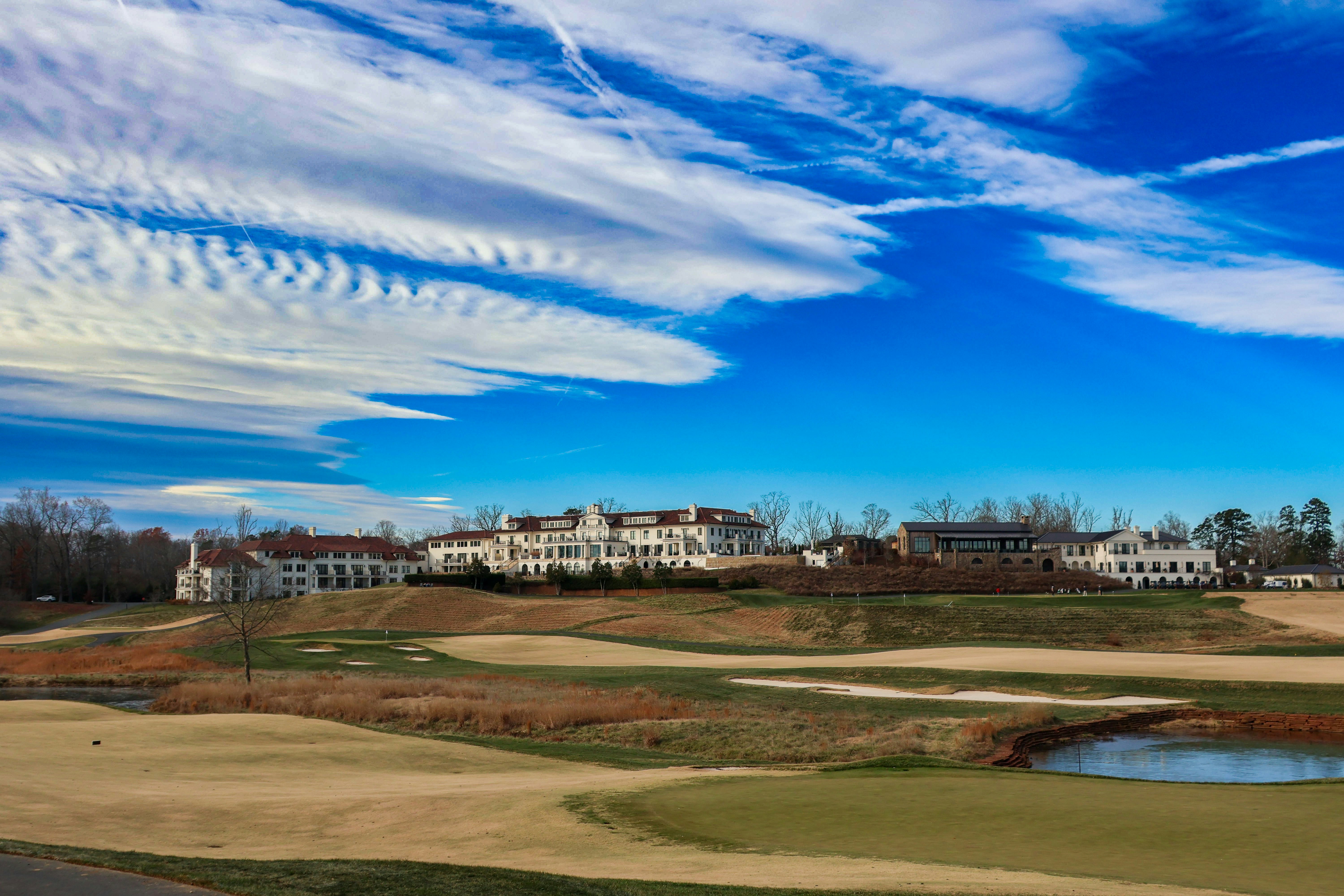 A view of a golf course from a distance photo – Free Keswick hall Image ...