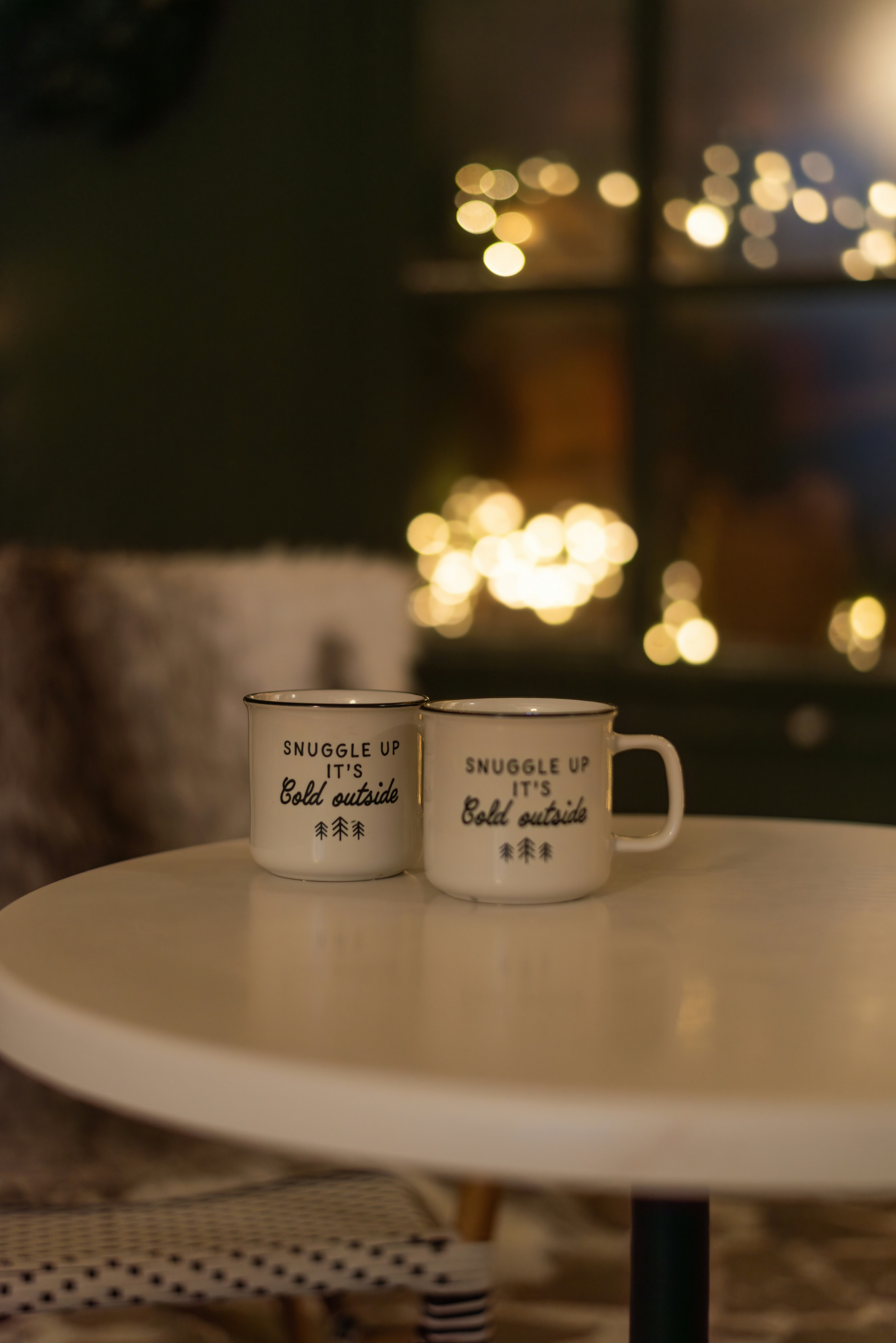 Two coffee mugs sitting on top of a white table photo – Free Київ Image ...