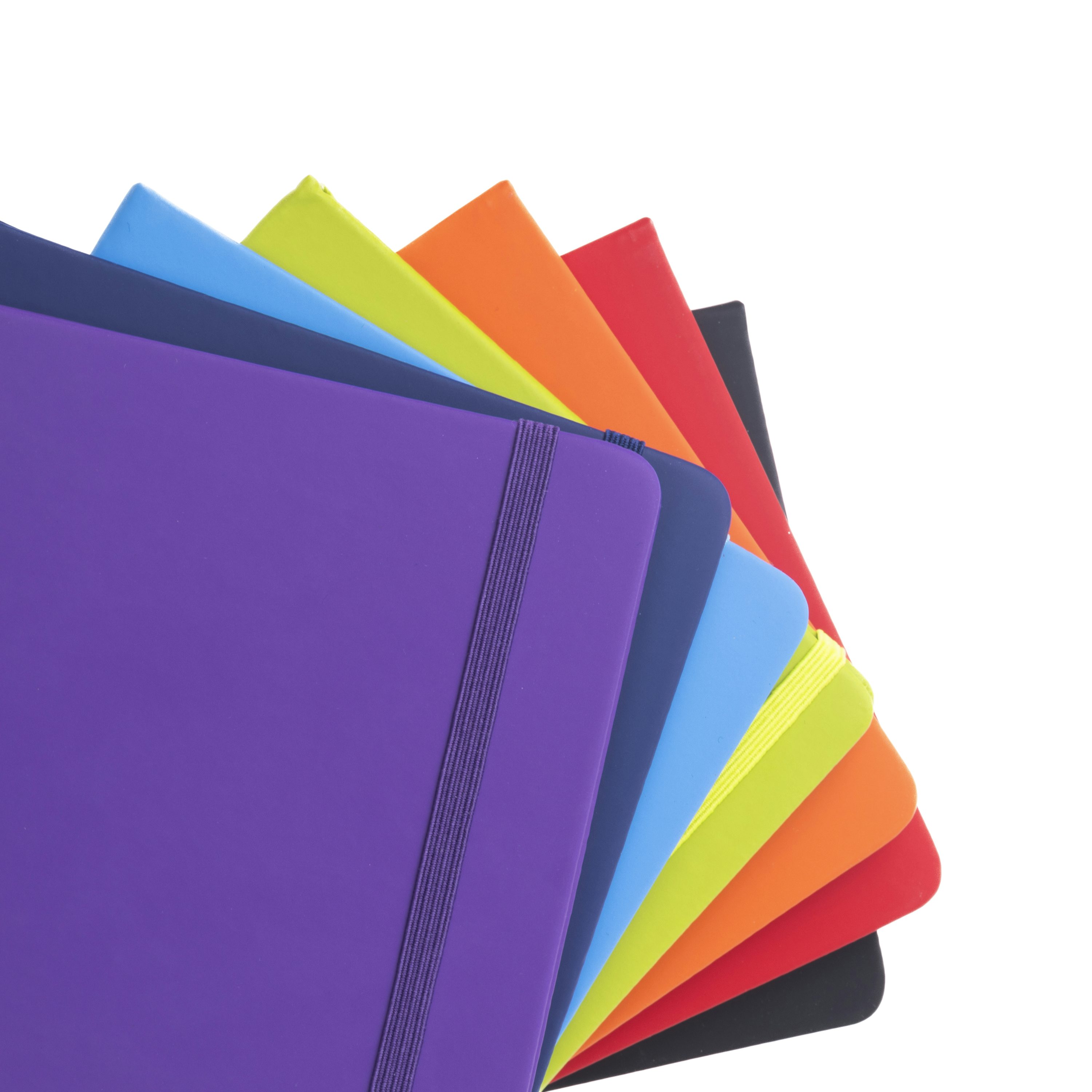 A bunch of different colored notebooks stacked on top of each other ... A bunch of different colored notebooks stacked on top of each other ...