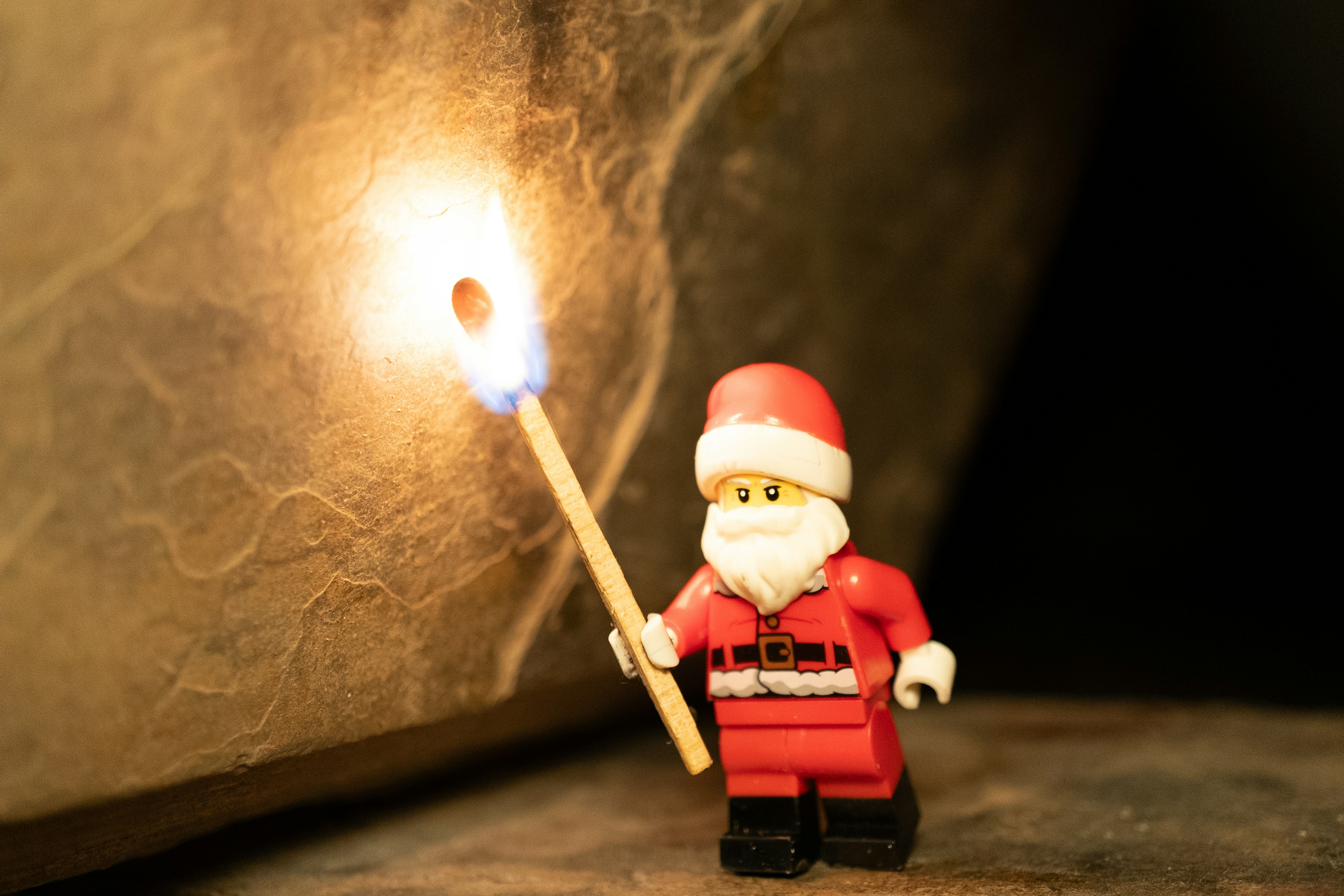 A lego santa clause holding a lit candle photo – Free Light Image on ...