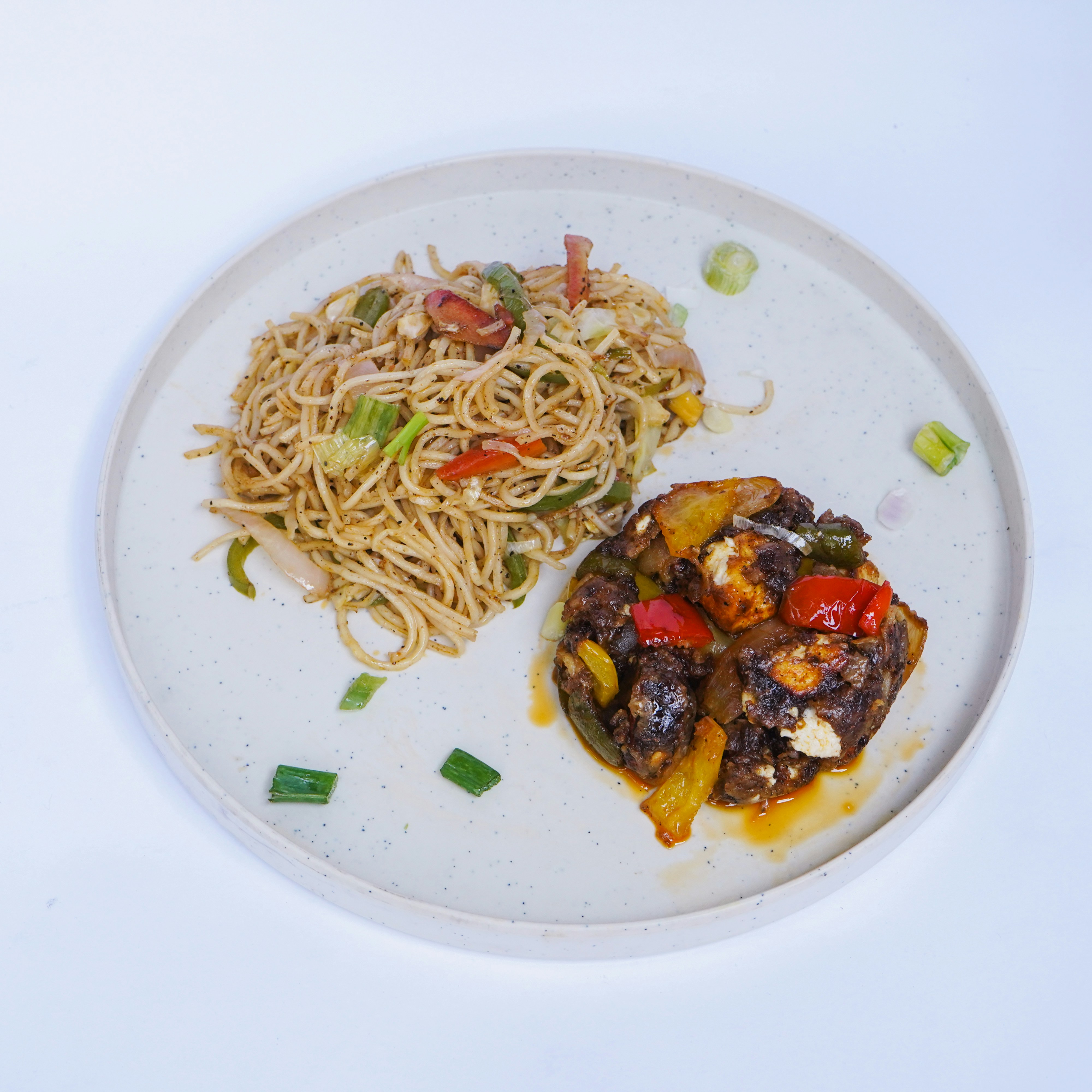 Split Plate, Twin Flavors: Noodle Stir-Fry and Pepper-Cherry Kick