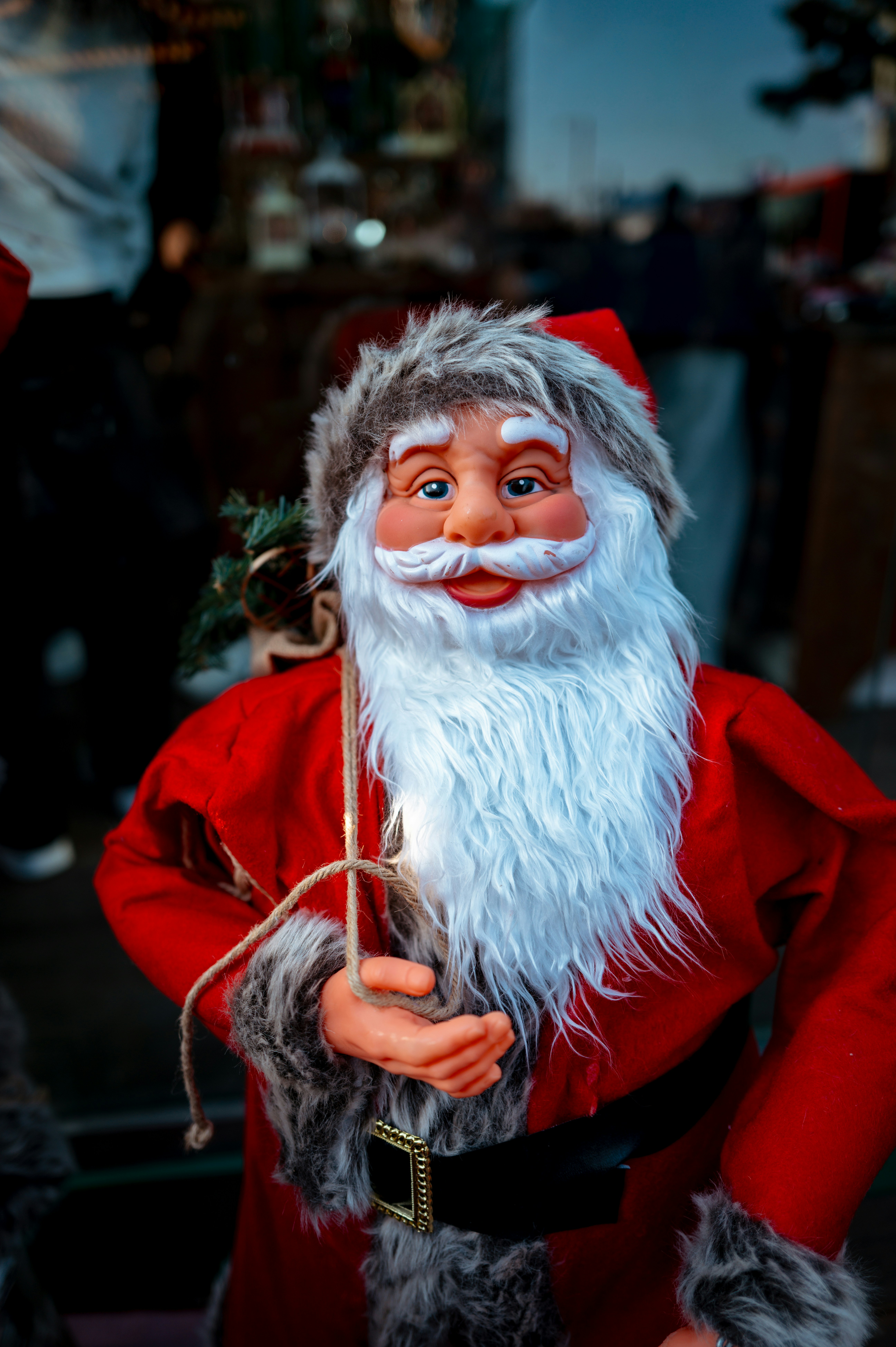 A man dressed as santa claus holding an umbrella photo – Free Adult ...