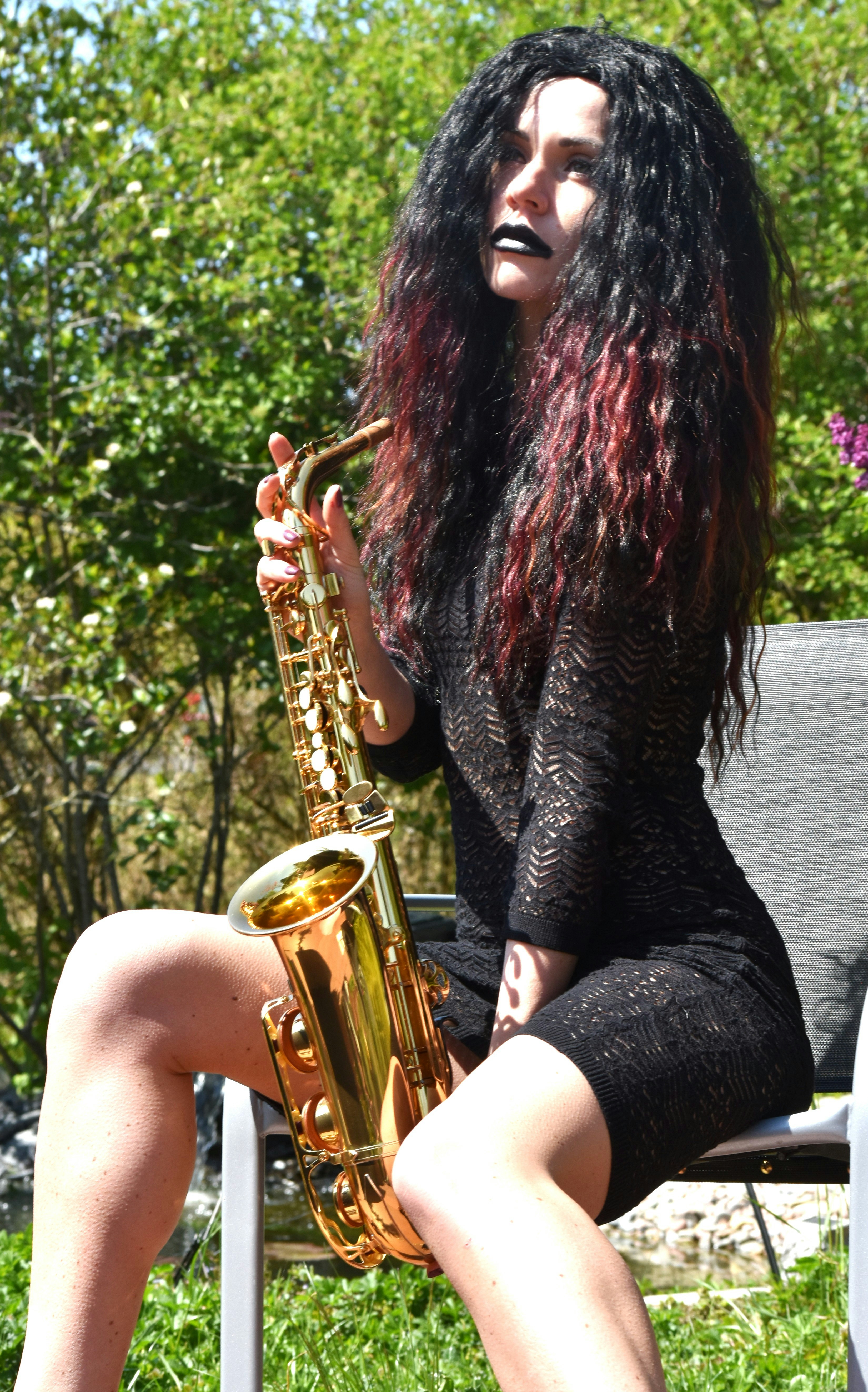 Hair of Night, Brass in Sun: A Garden Sax Portrait