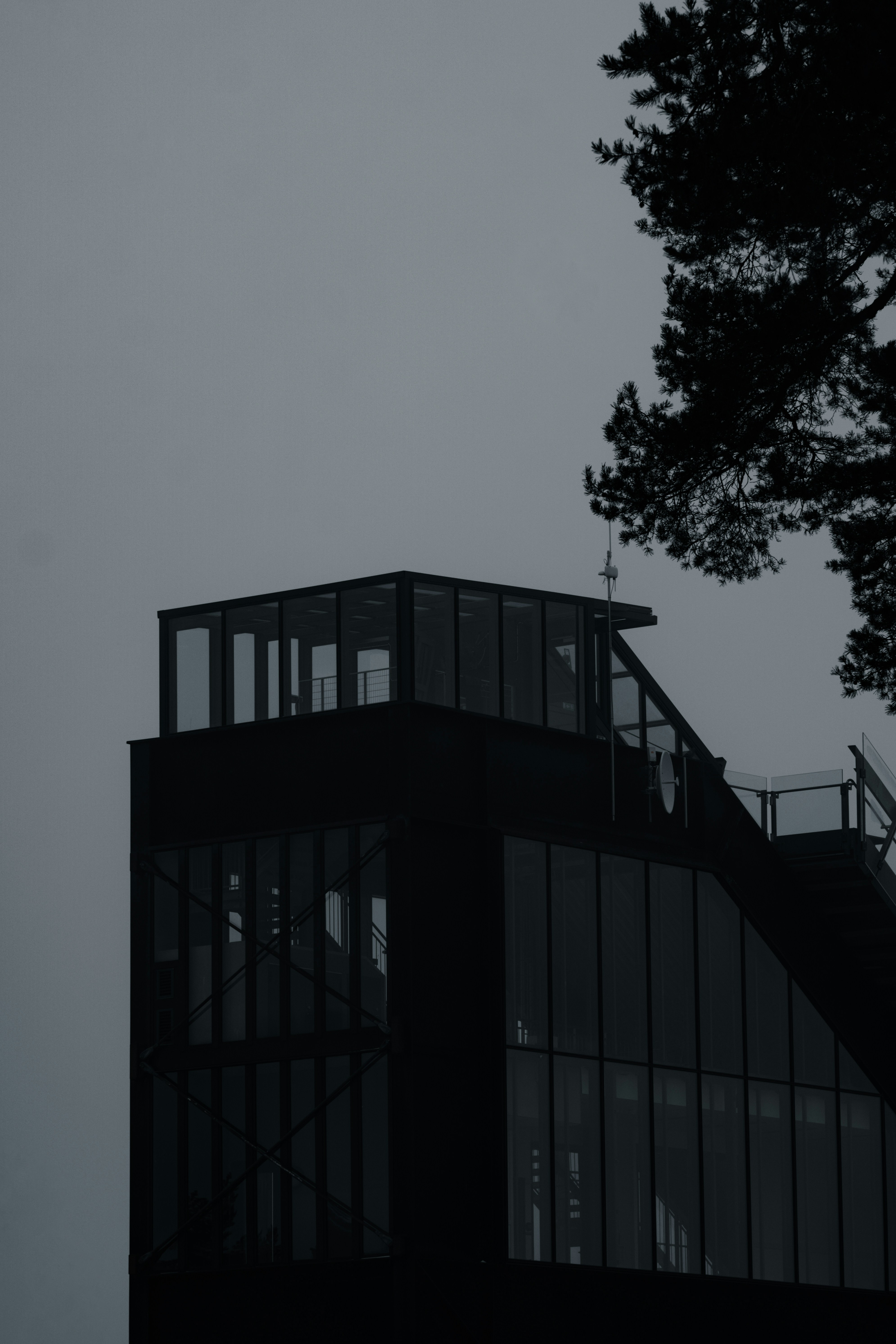 A black and white photo of a tall building