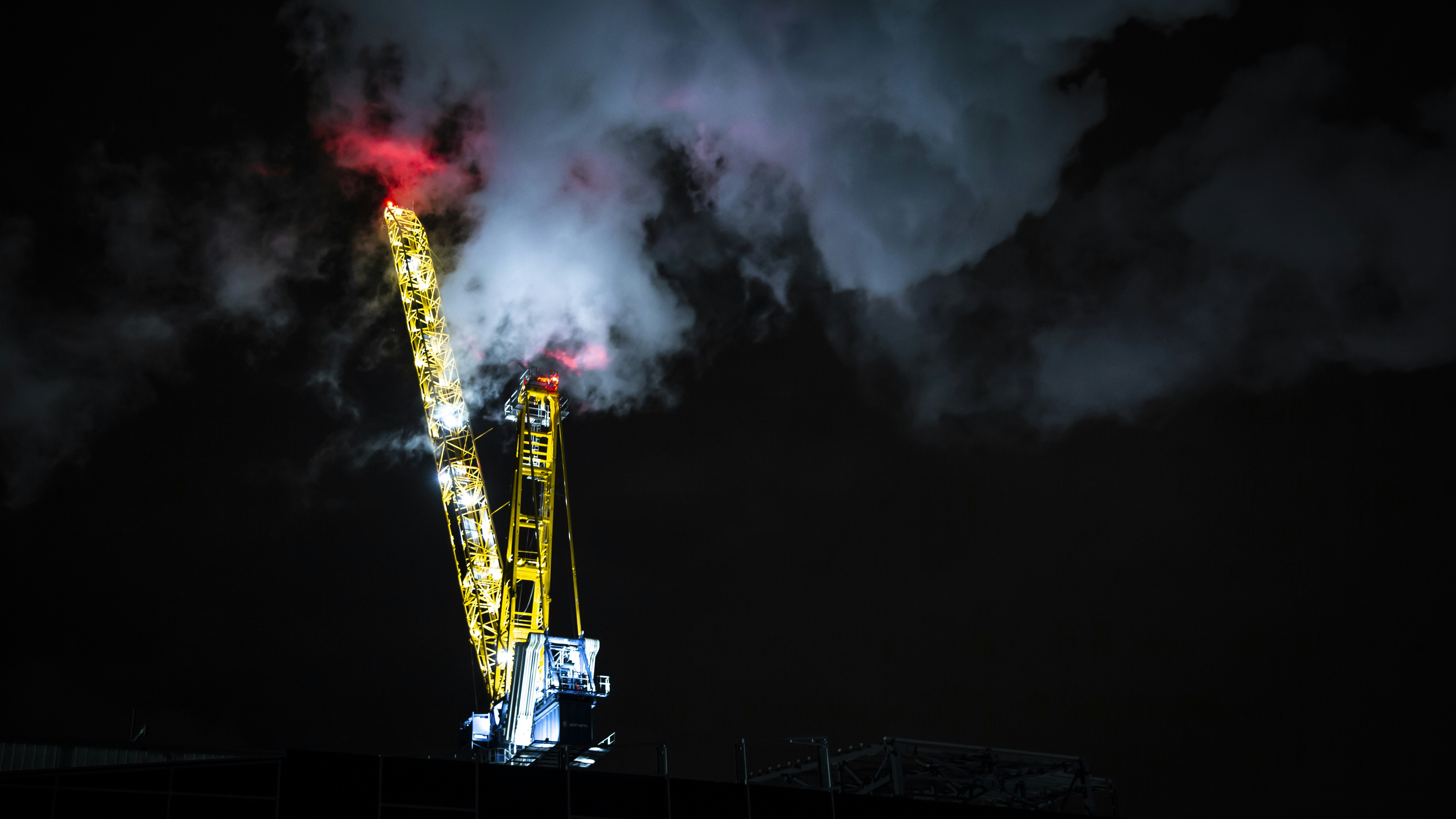 Nightfire Rig Crowned by Flame and Smoke