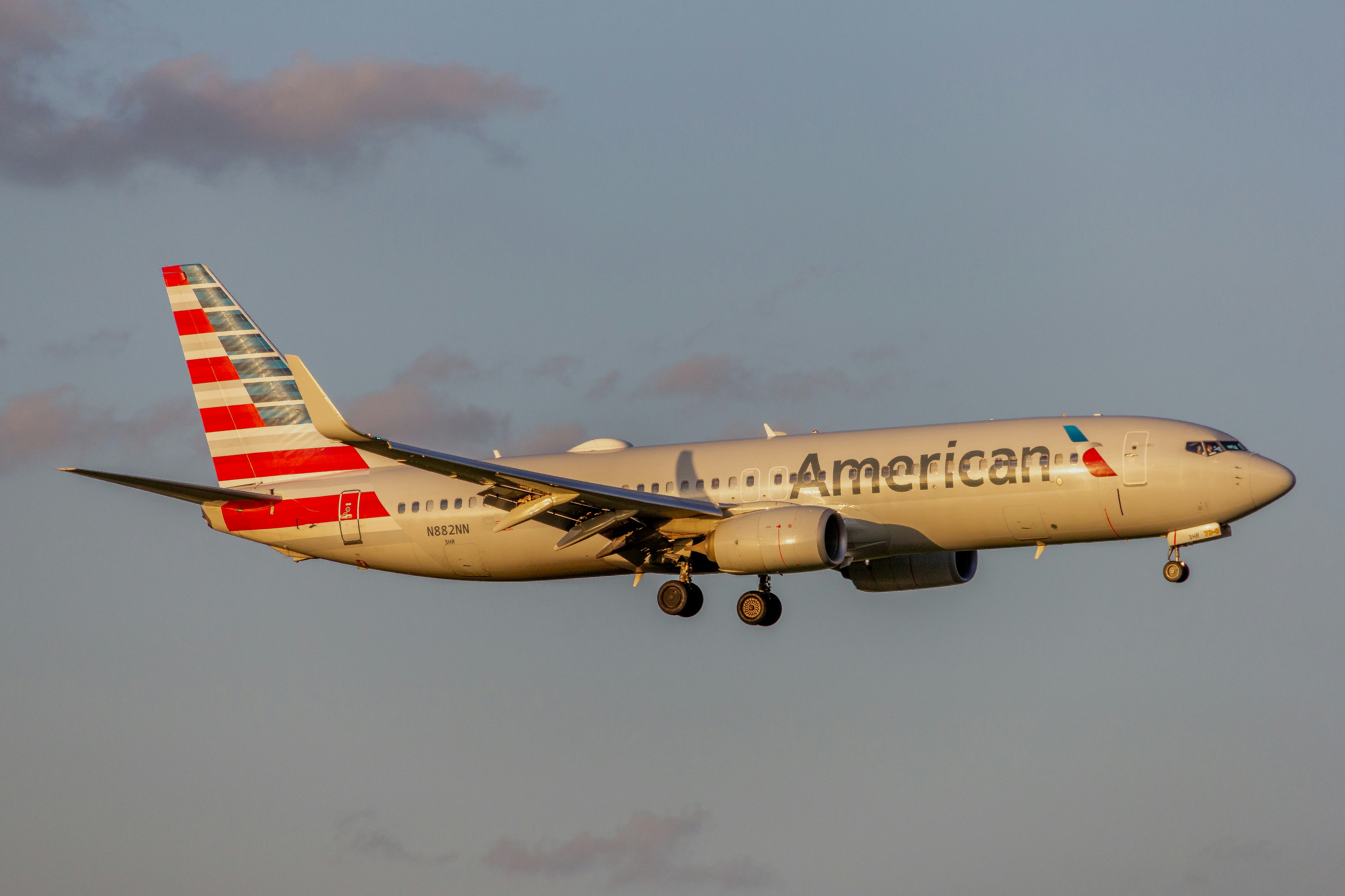 An american airlines plane flying in the sky photo – Free Dfw airport ...