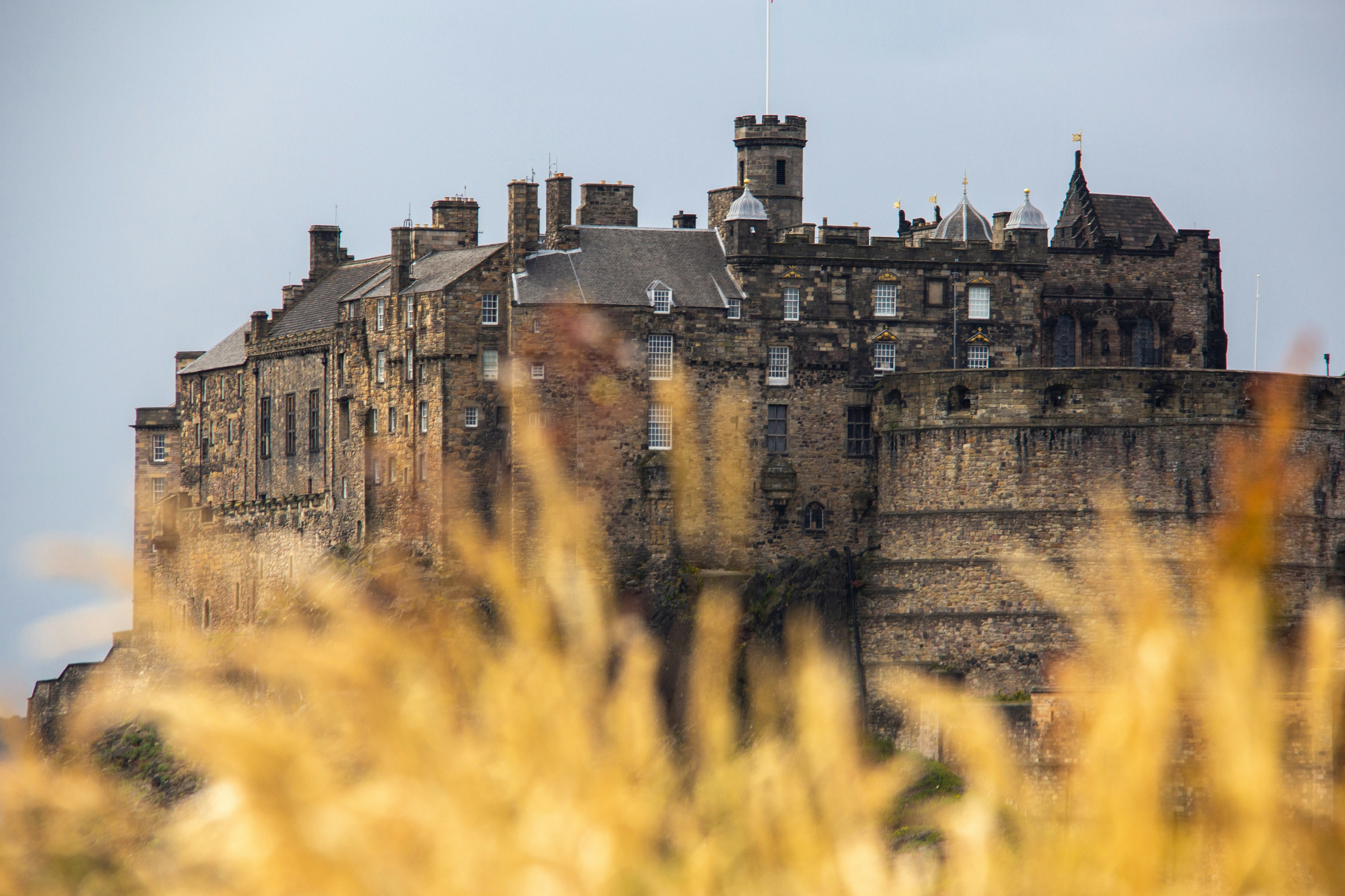 A tall castle with a flag on top of it photo – Free Wallpaper 4k Image ...