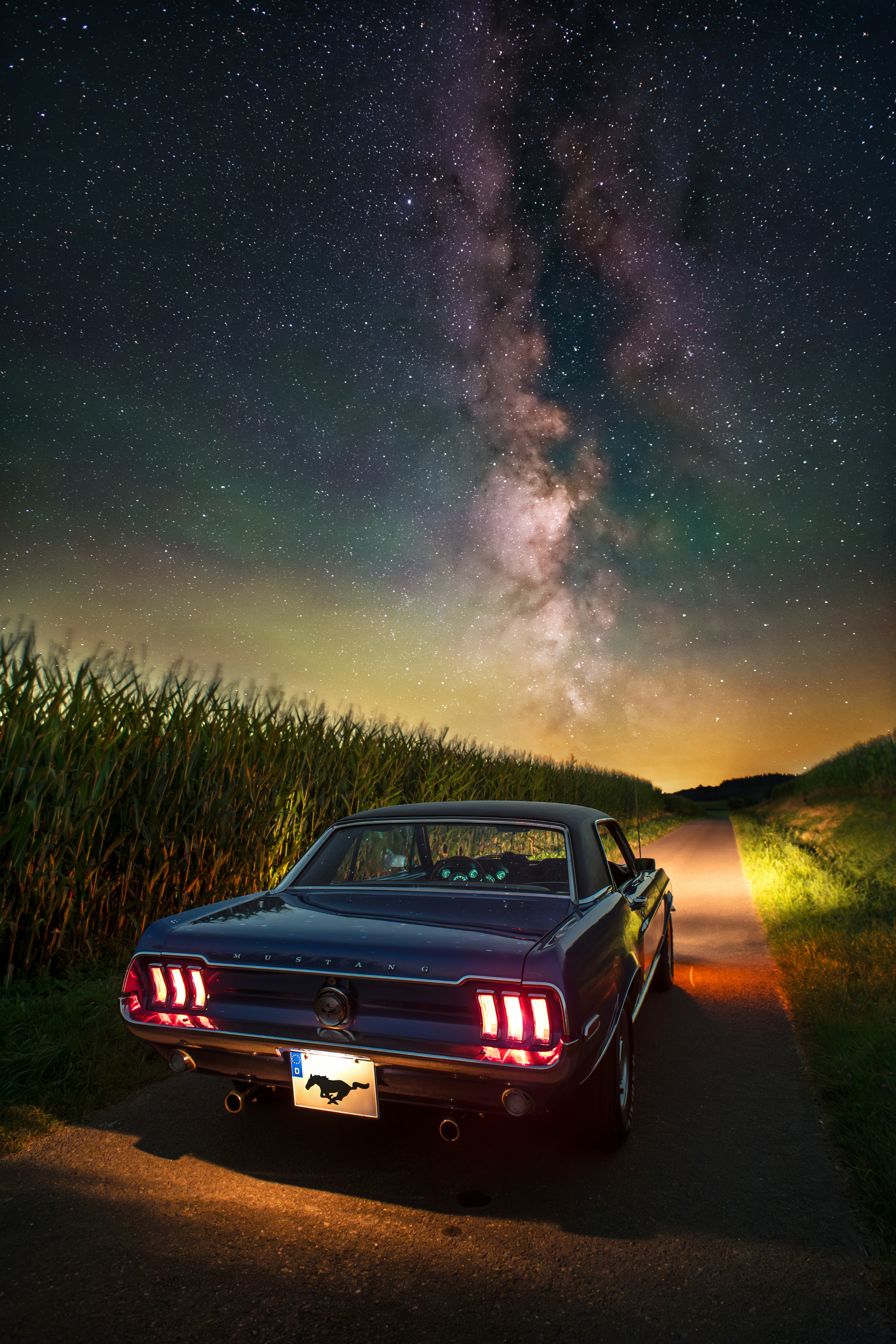 Milky Way Over a Midnight Mustang on a Backcountry Road