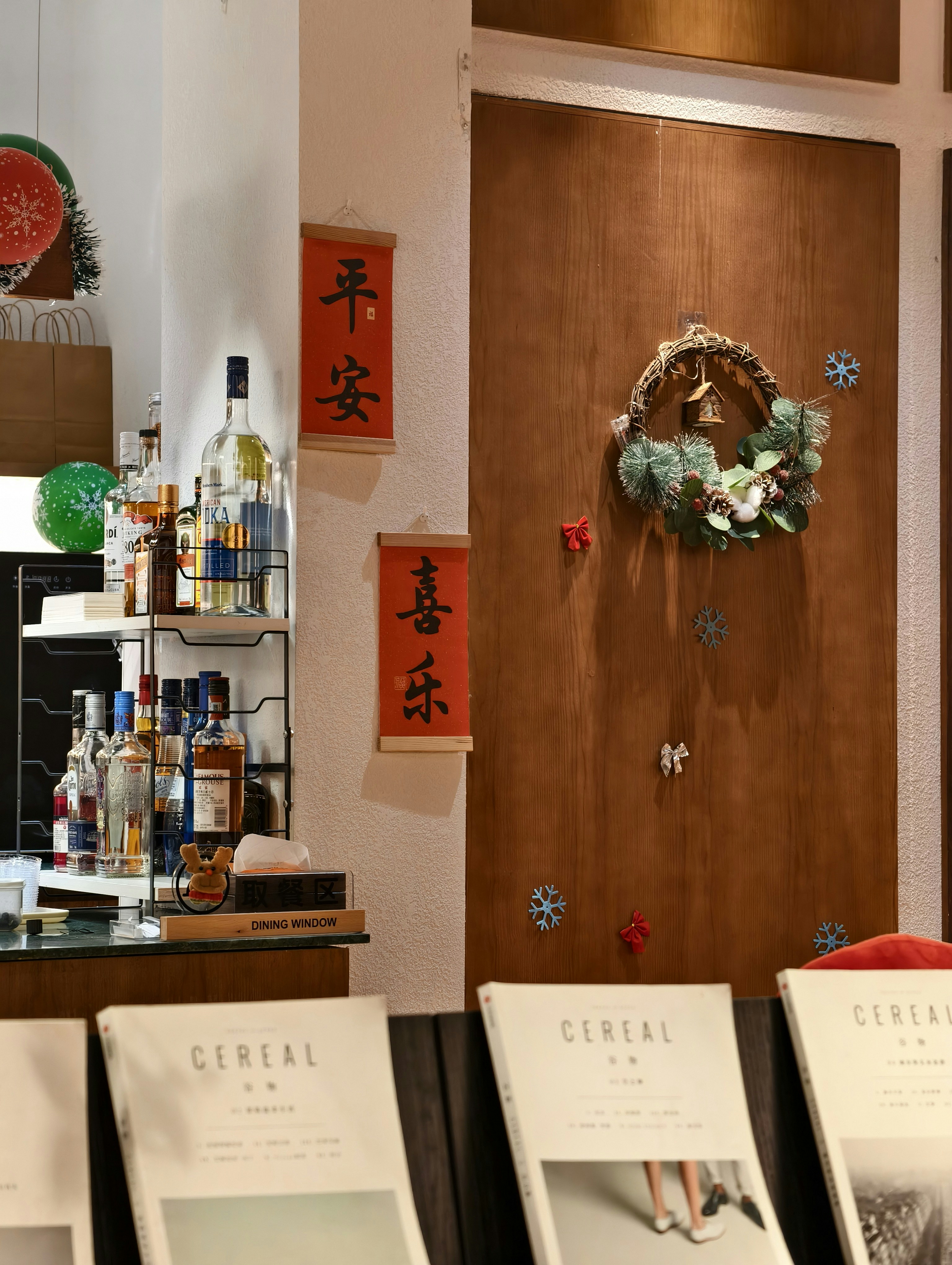 A restaurant with a bunch of menus on the counter photo – Free ...