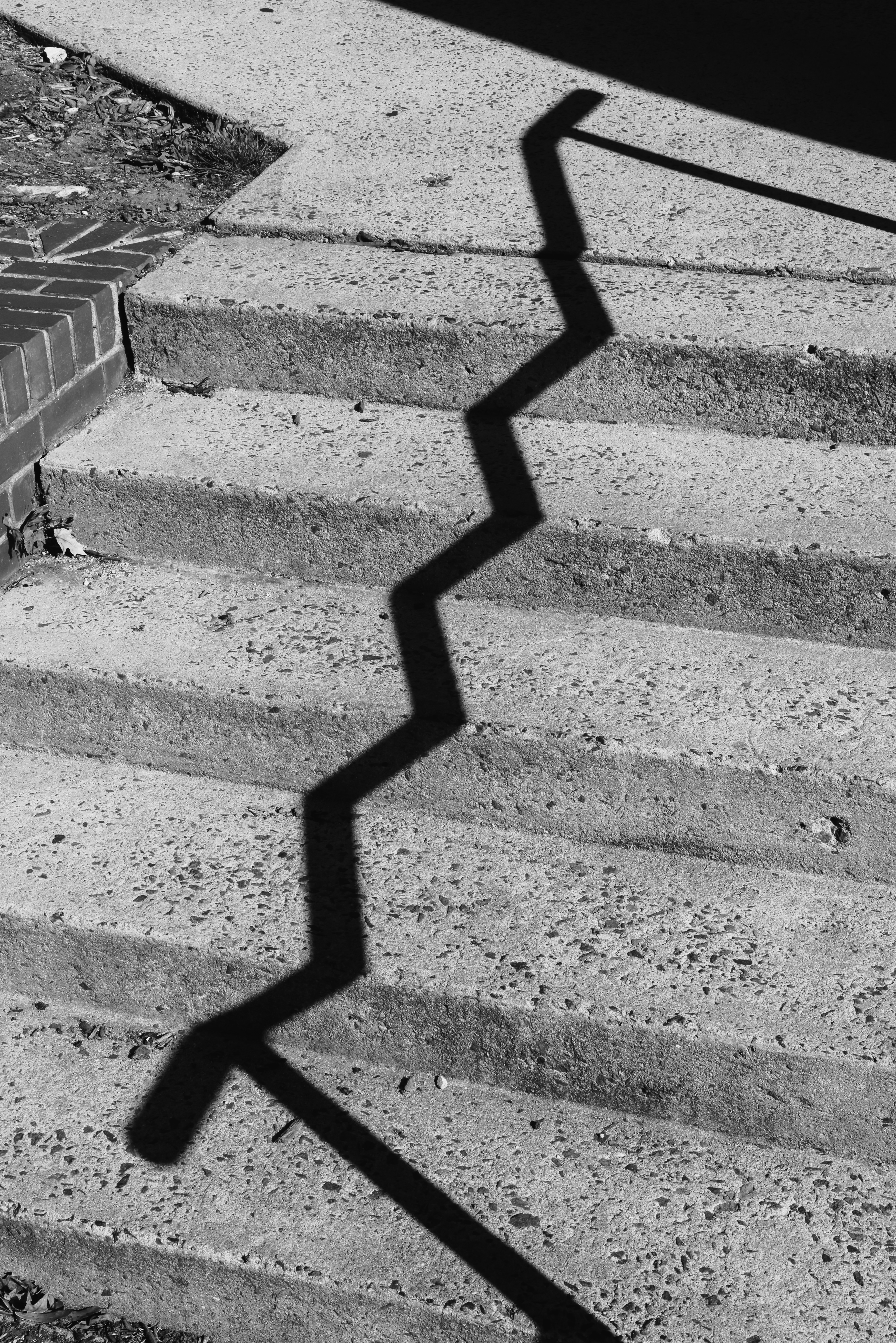 Shadowed Zigzag: Geometry of Light on Weathered Steps