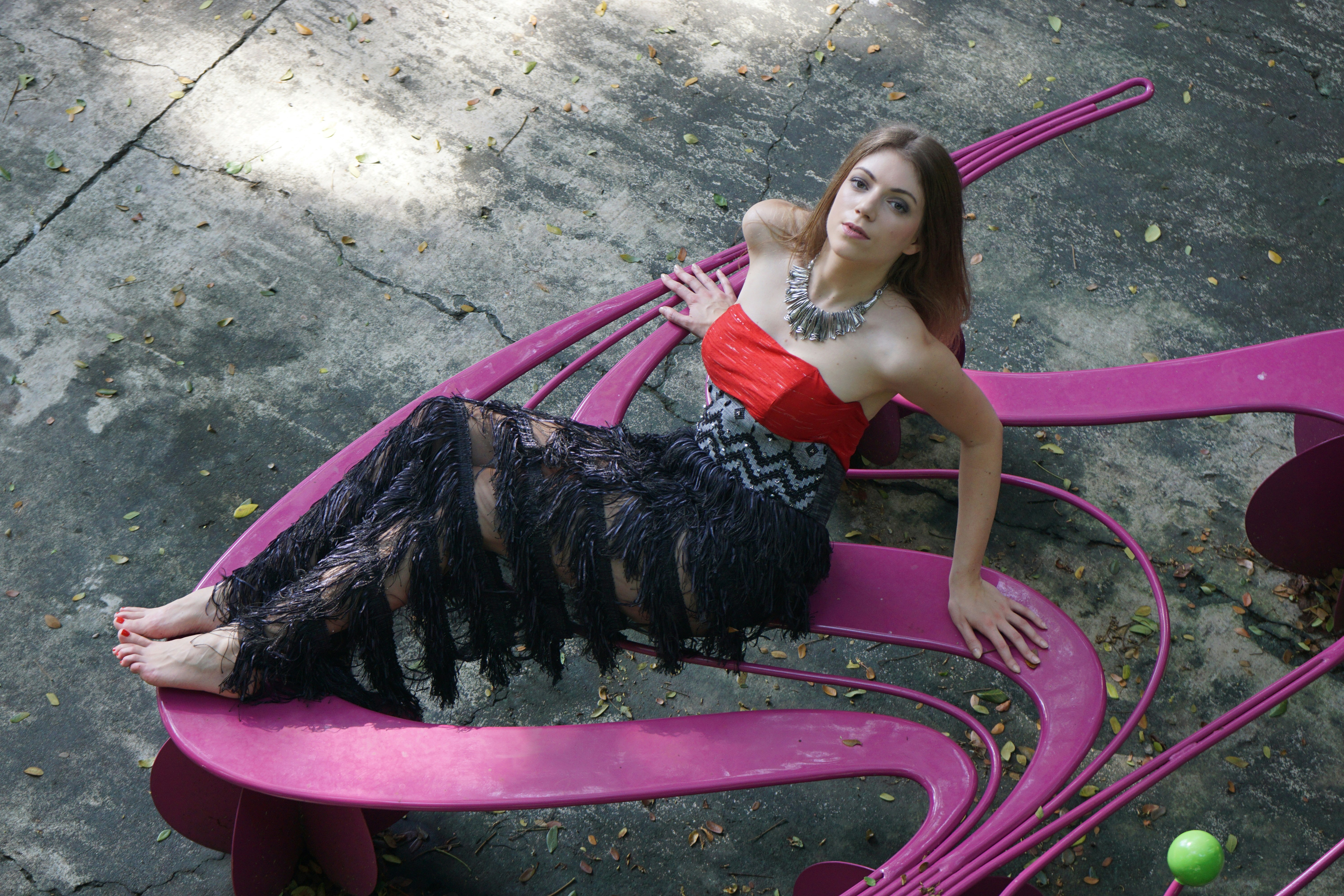 Concrete Confetti: A Pose on Magenta Bench Blues