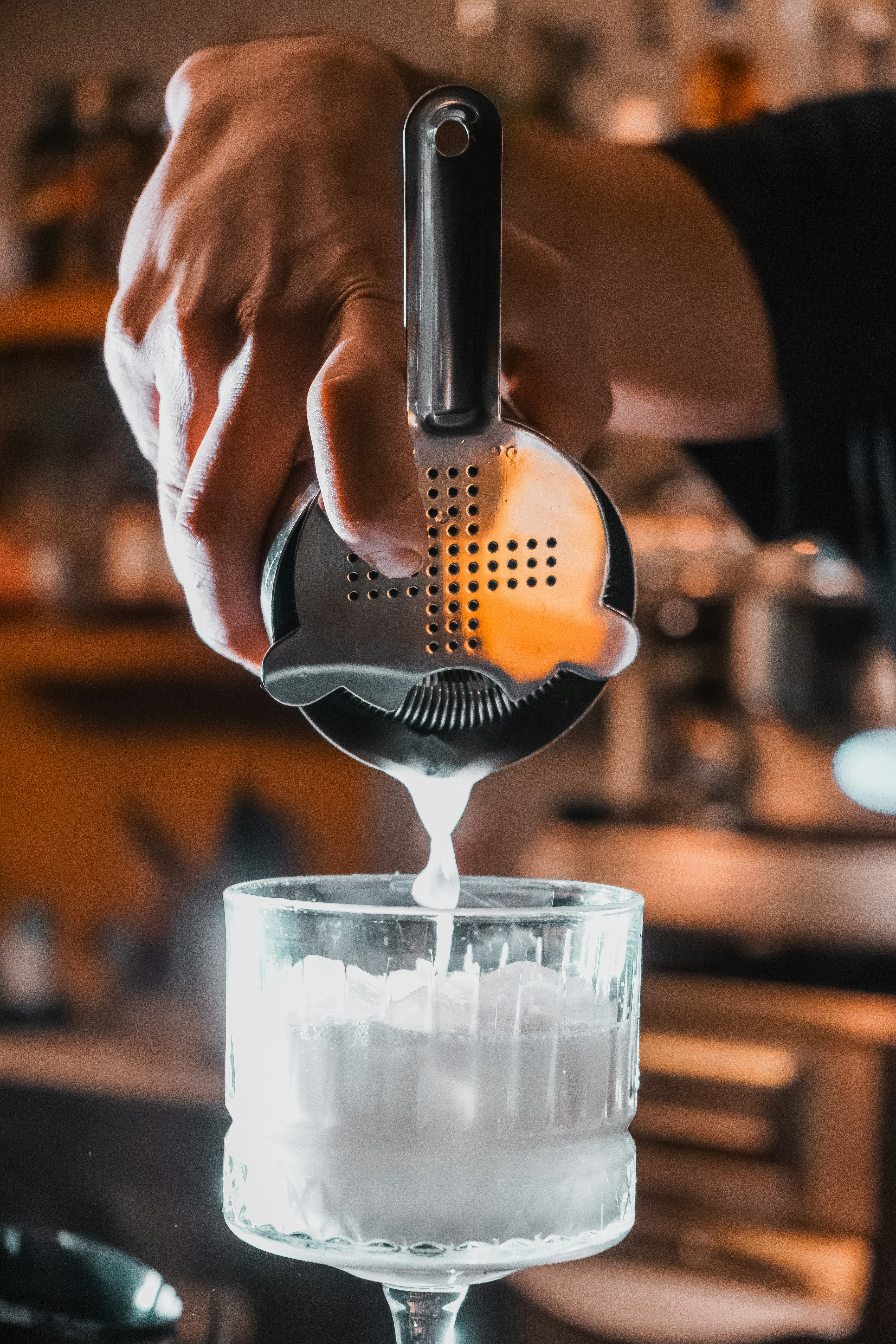 Citrus Press in a Bar: Strain and Pour