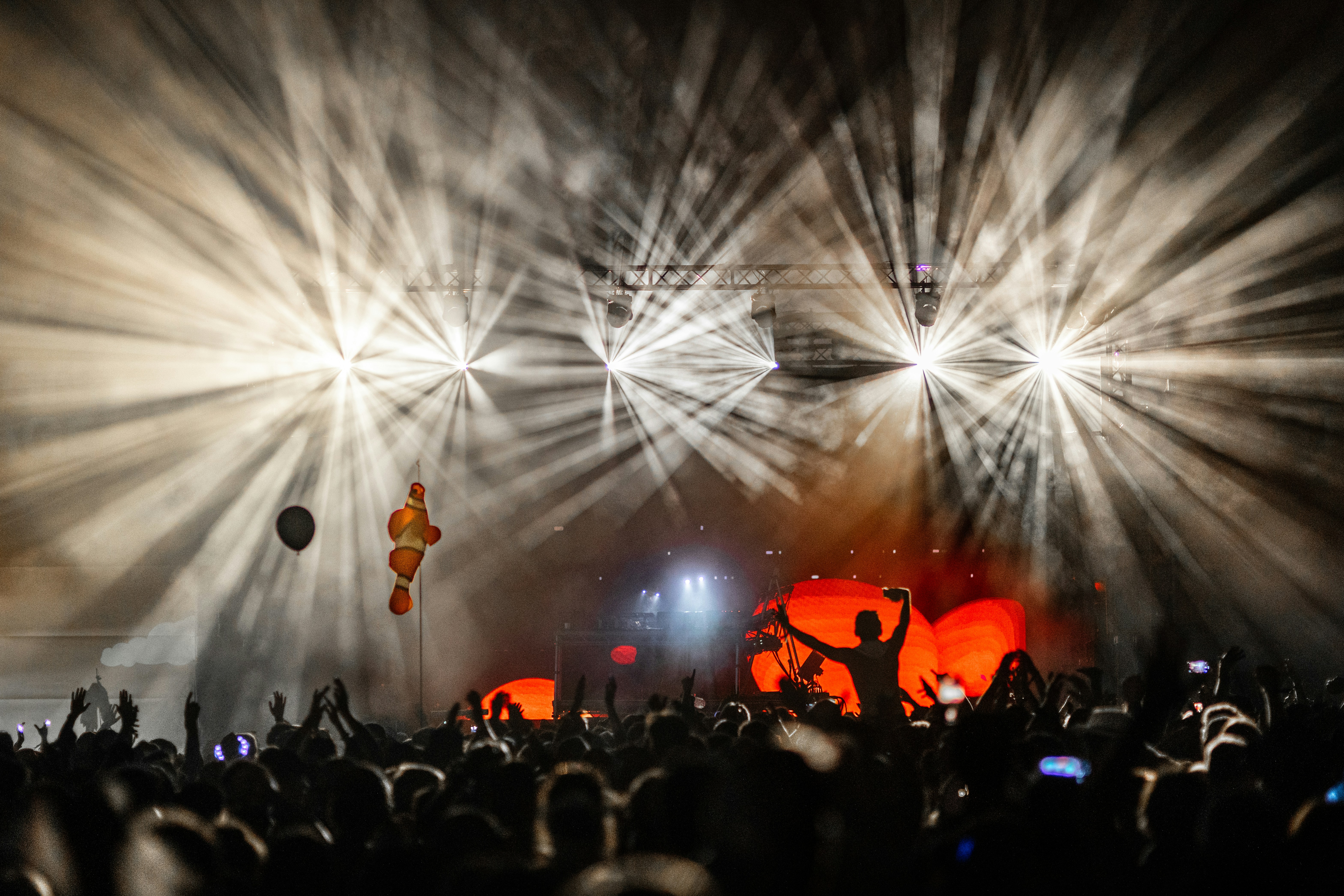A large crowd of people at a concert photo – Free Human Image on Unsplash