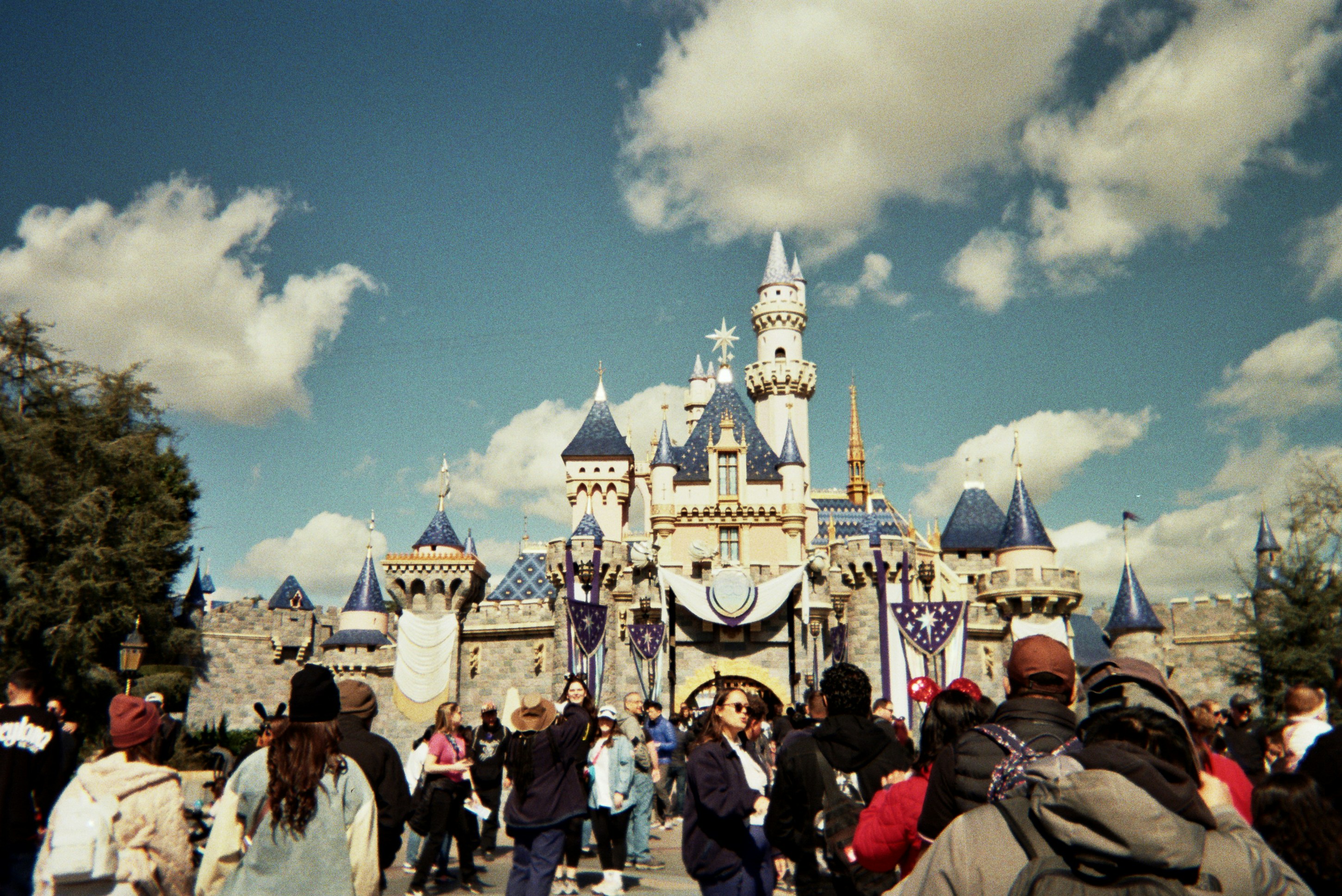 A crowd of people standing in front of a castle photo – Free Film ...